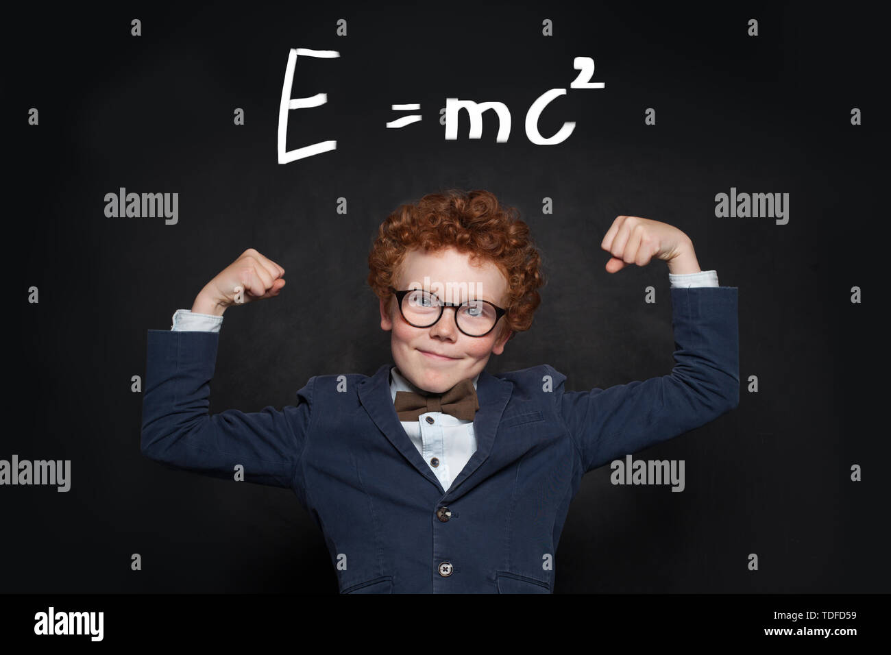 Strong and smart child student on blackboard with science formula Stock ...