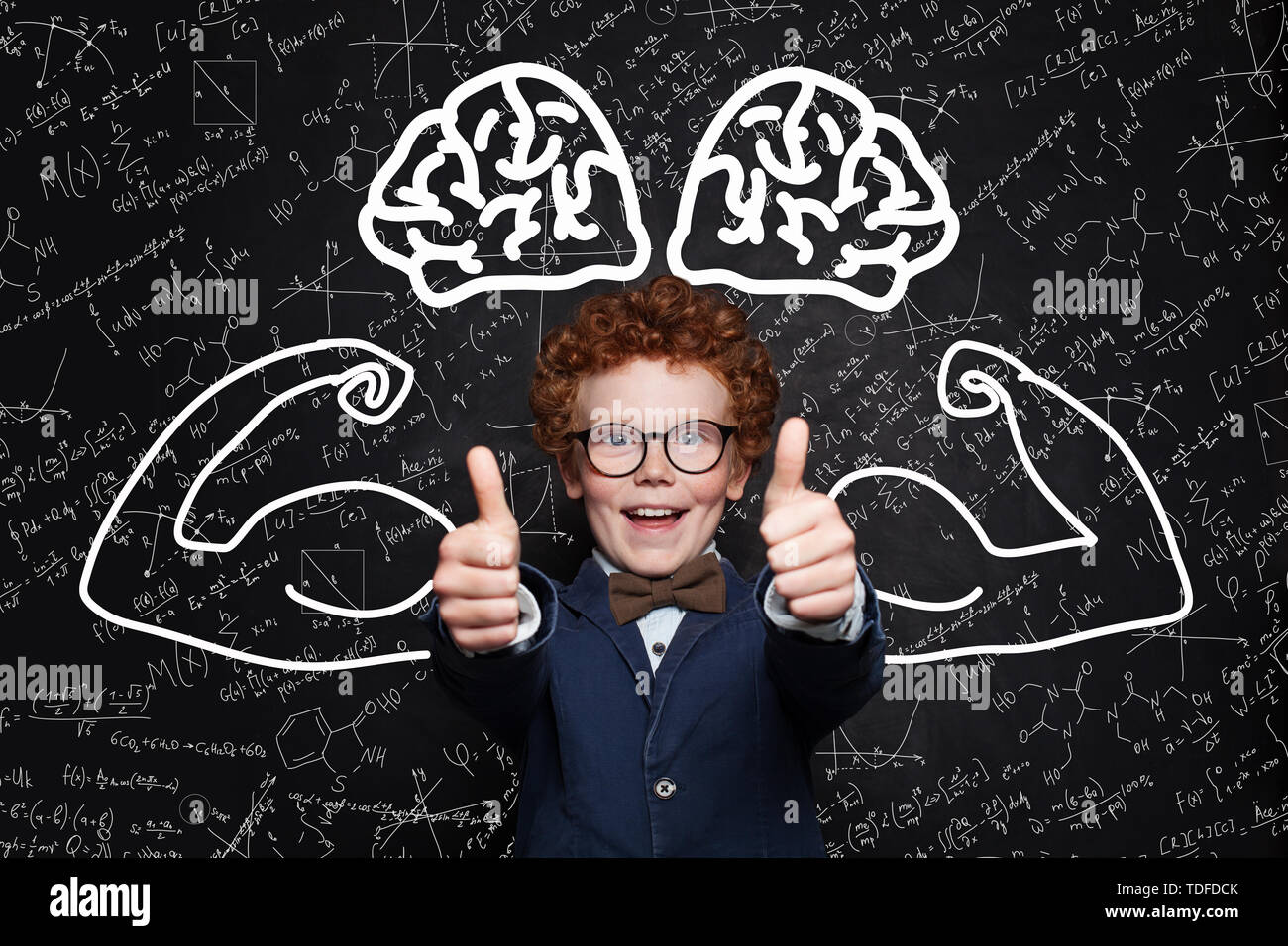 Science power. Happy child student on blackboard with science formulas ...
