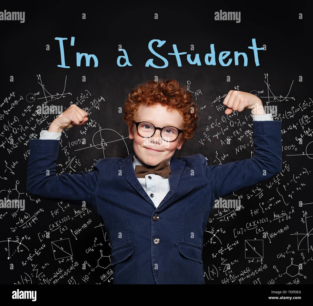 Little child student. Smart redhead kid in suit and glasses on ...