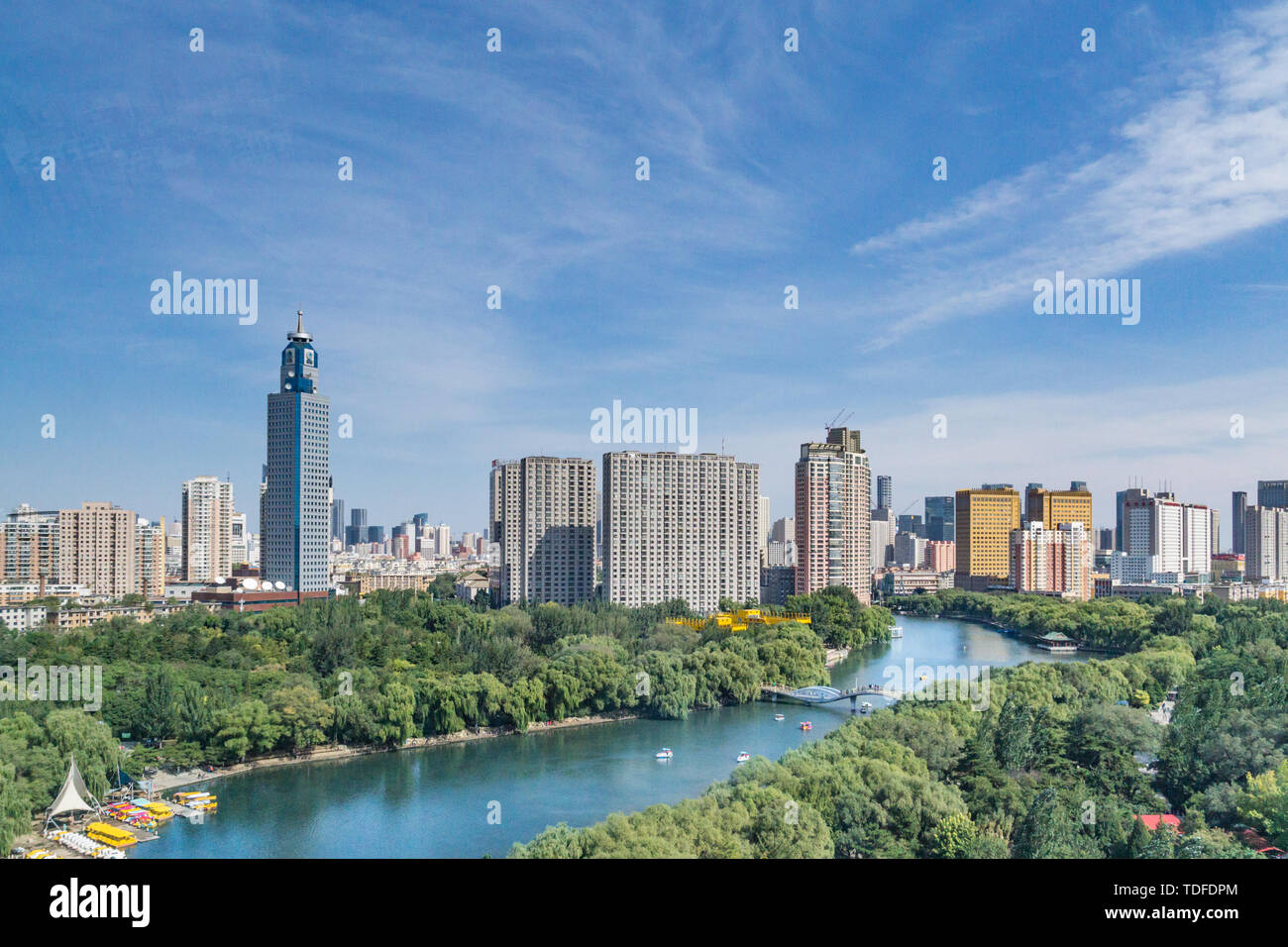 Autumn overlooking urban buildings, woods and rivers in Shenyang, China ...