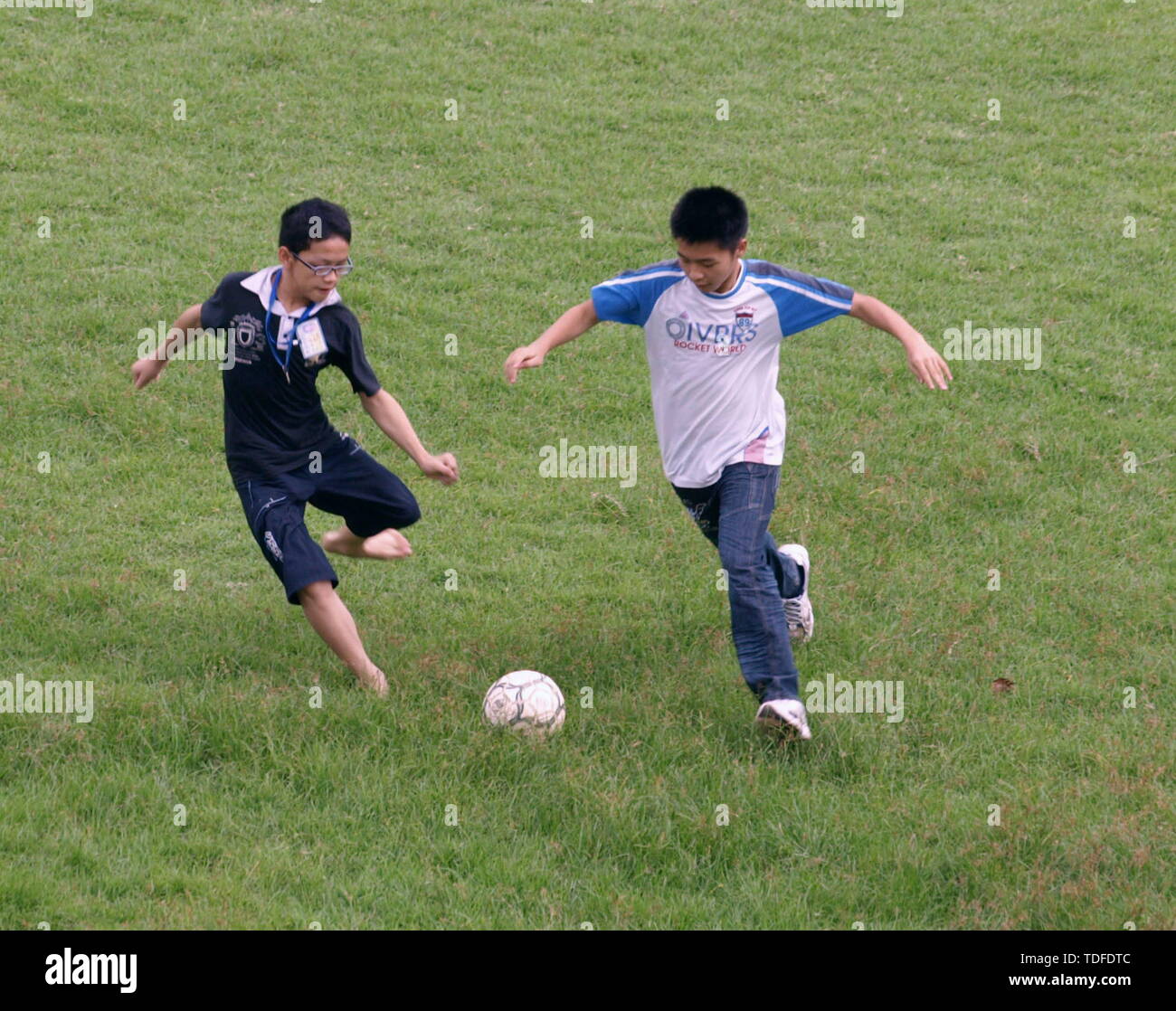 People Playing Football In Action