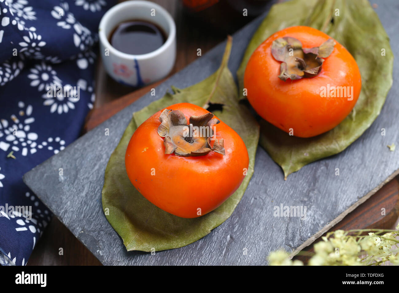 Picking Persimmons High Resolution Stock Photography and Images - Alamy