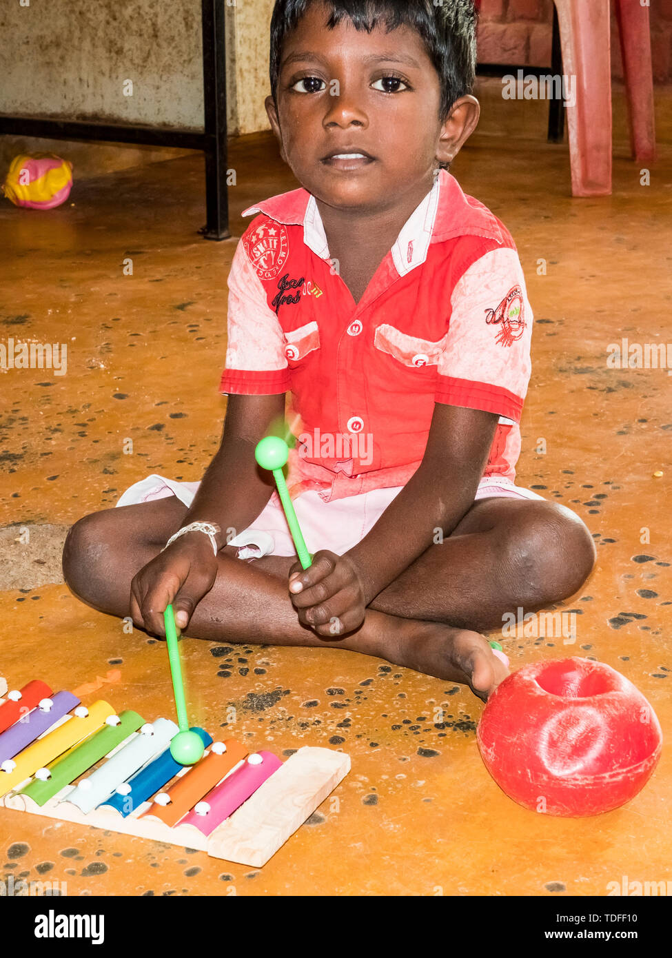 PUDUCHERY, INDIA - DECEMBER Circa, 2018. Interior of poor kids playing ...