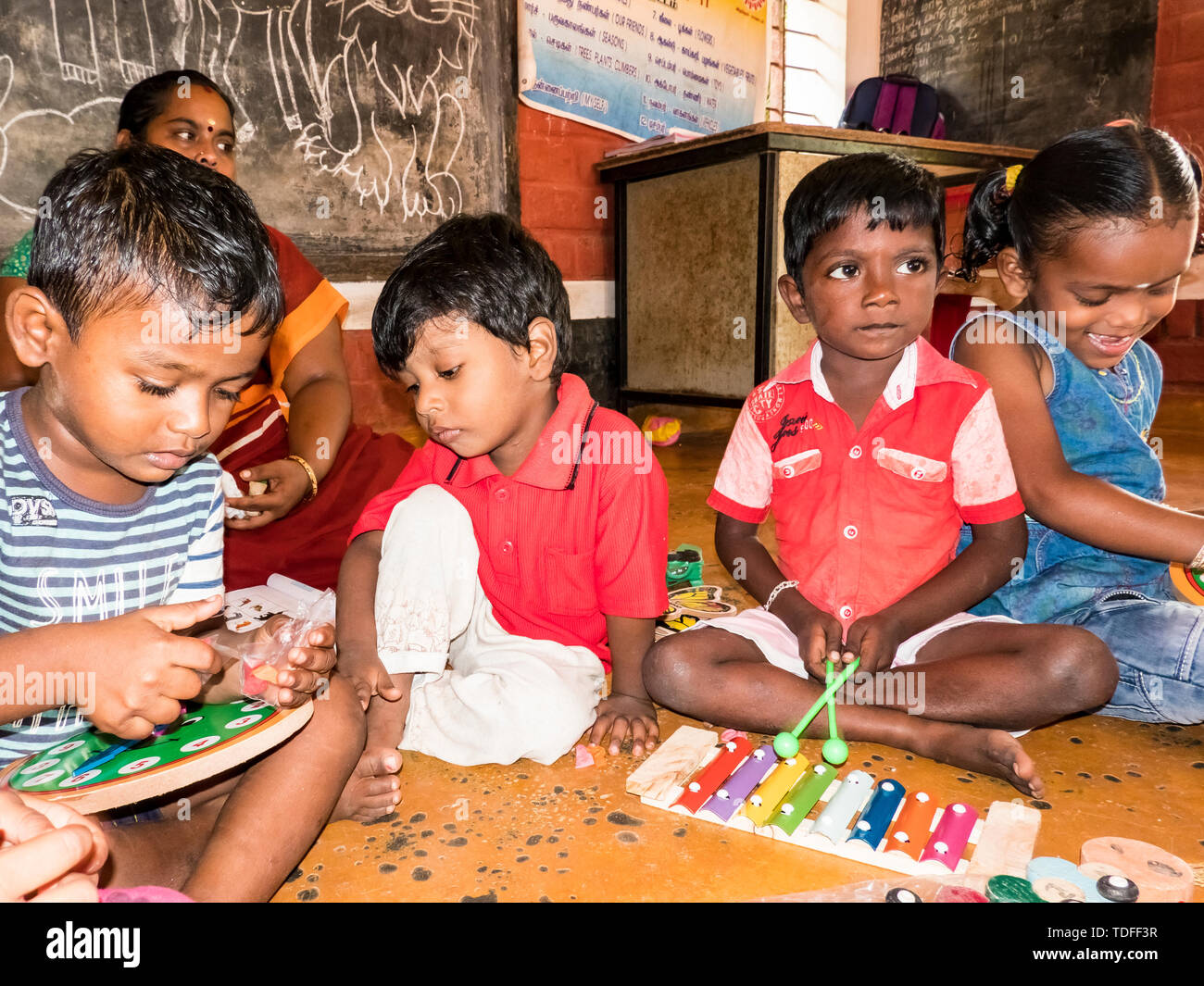 Poor indian children playing toy hi-res stock photography and images ...