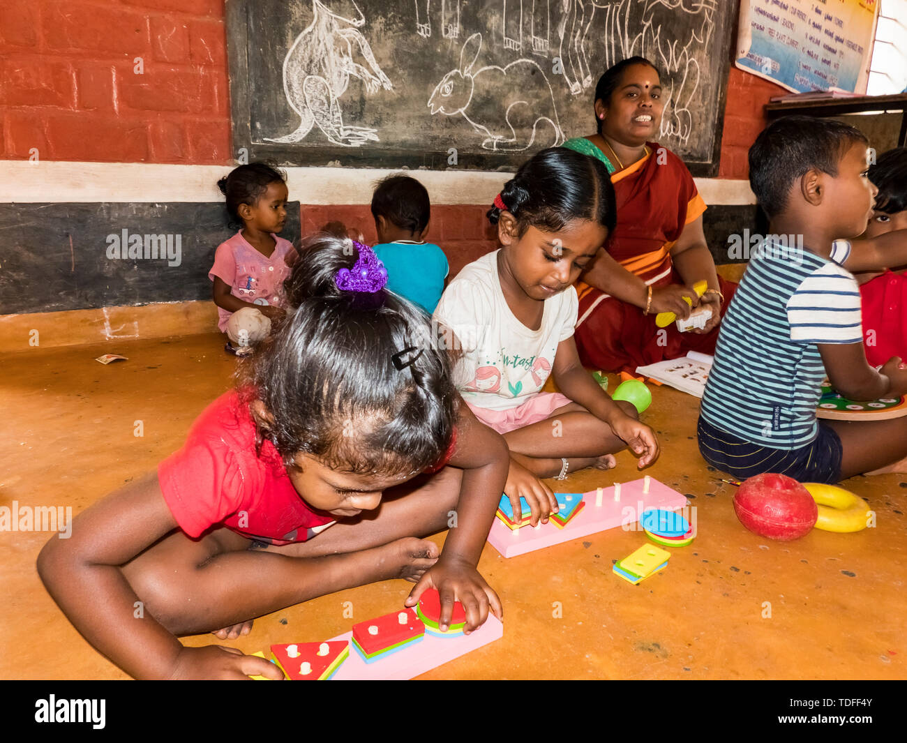 Poor indian children playing toy hi-res stock photography and images ...