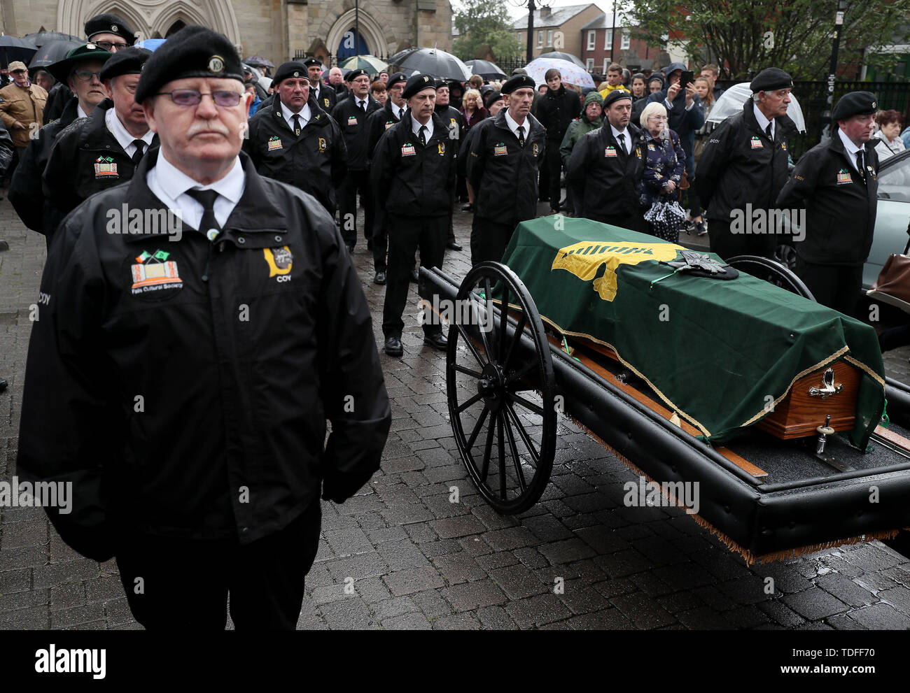 The coffin of former Provisional IRA leader Billy McKee is accompanied ...