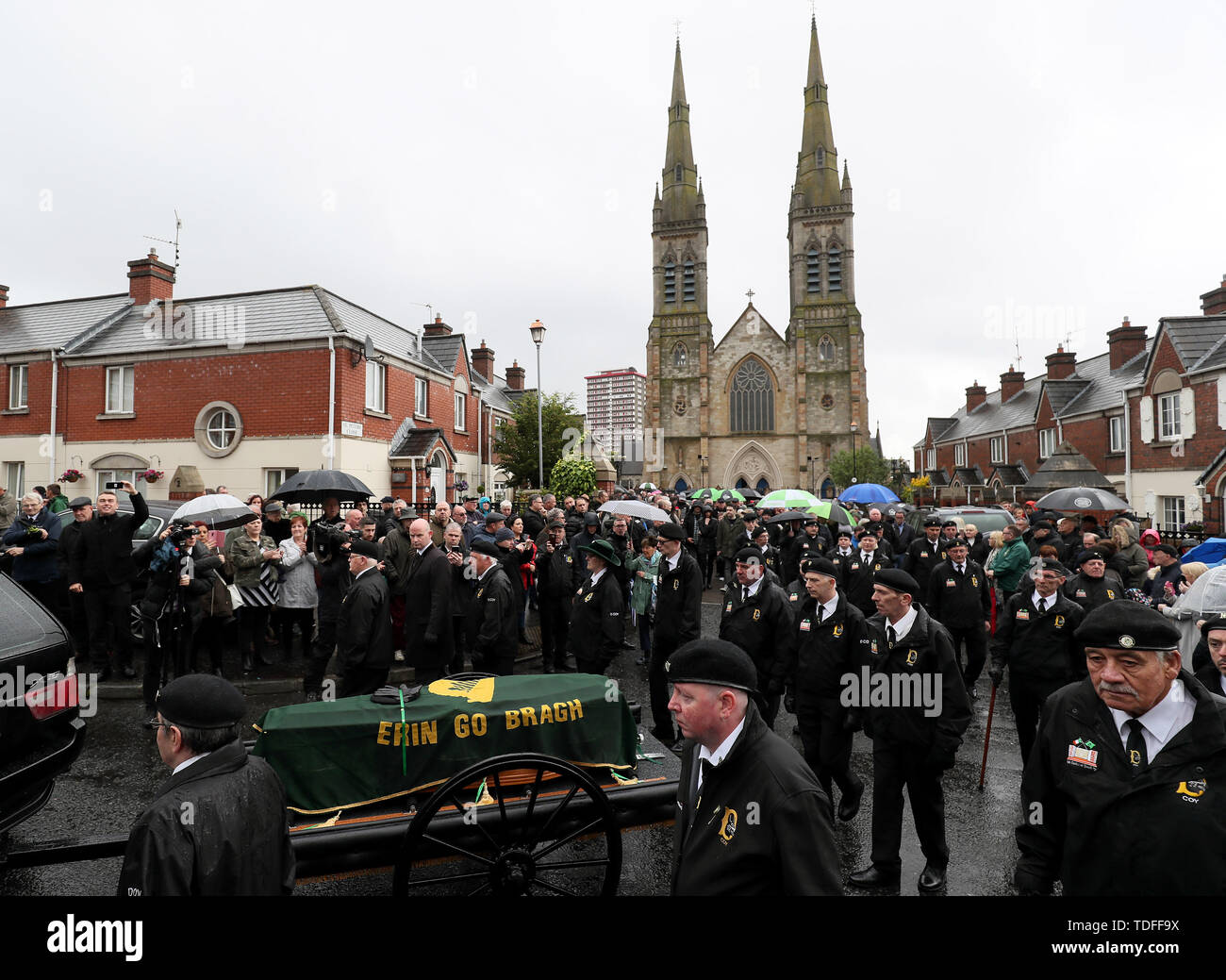 The coffin of former Provisional IRA leader Billy McKee is accompanied ...
