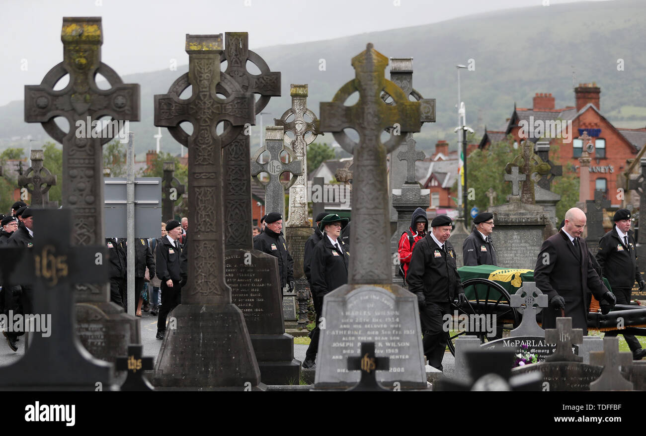 The coffin of former Provisional IRA leader Billy McKee is accompanied ...