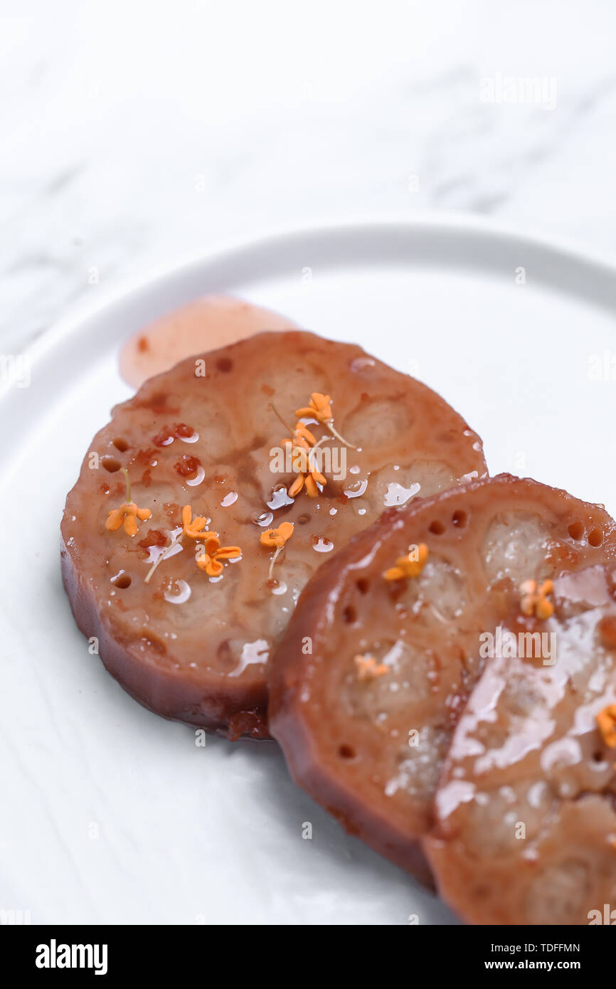 Traditional snack osmanthus glutinous rice lotus root Stock Photo - Alamy
