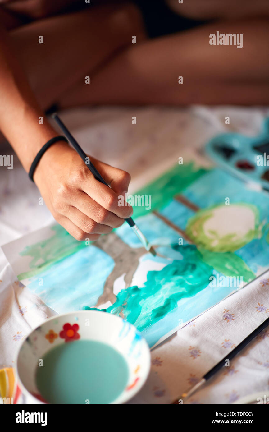 Painting, close up of hand making an artwork Stock Photo - Alamy