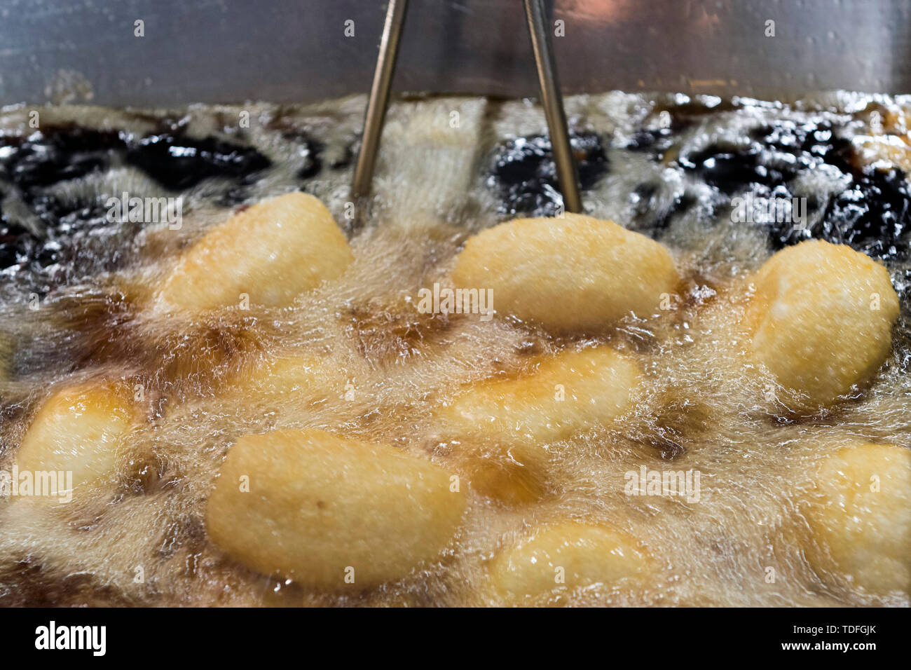 Ear to ear fried cake hi-res stock photography and images - Alamy