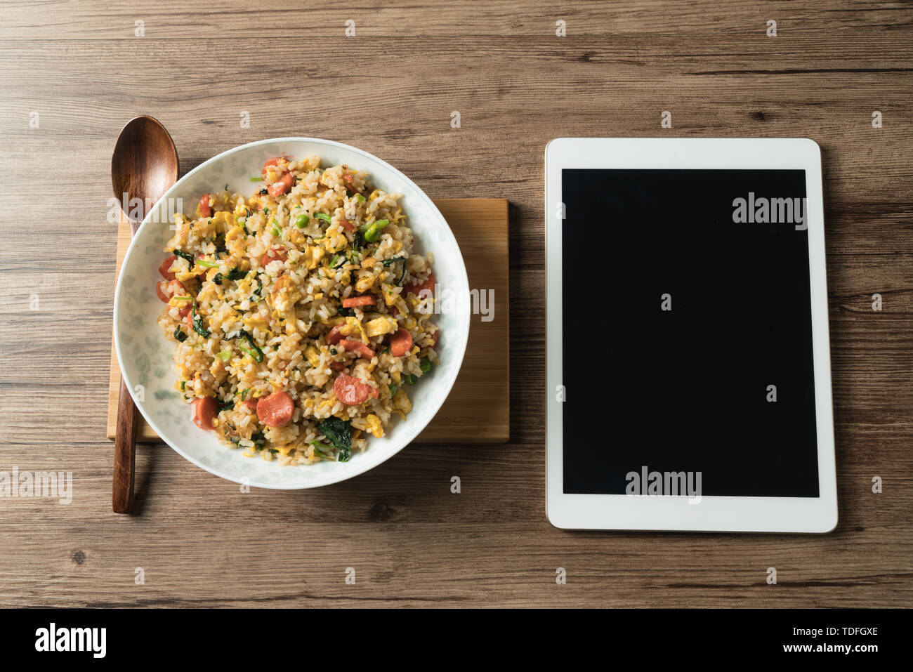 Egg fried rice with computer screen Stock Photo - Alamy