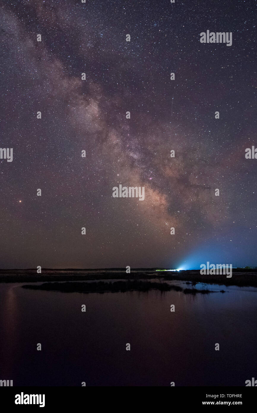 Galaxy in Xingkai Lake. Galaxy arch bridge, galactic on the lake, glow ...