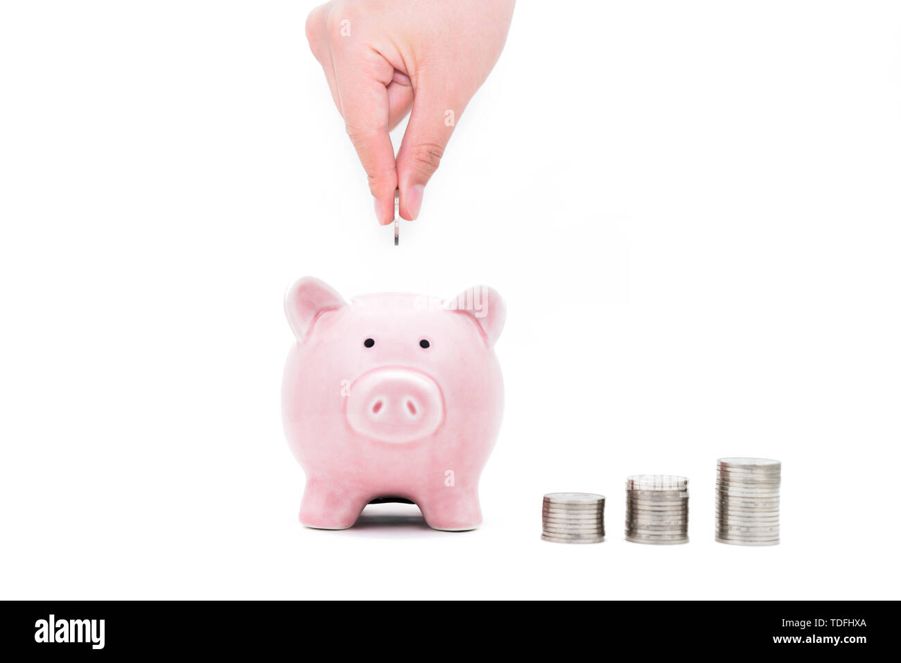 Savings pots, coins and hands in white background Stock Photo - Alamy