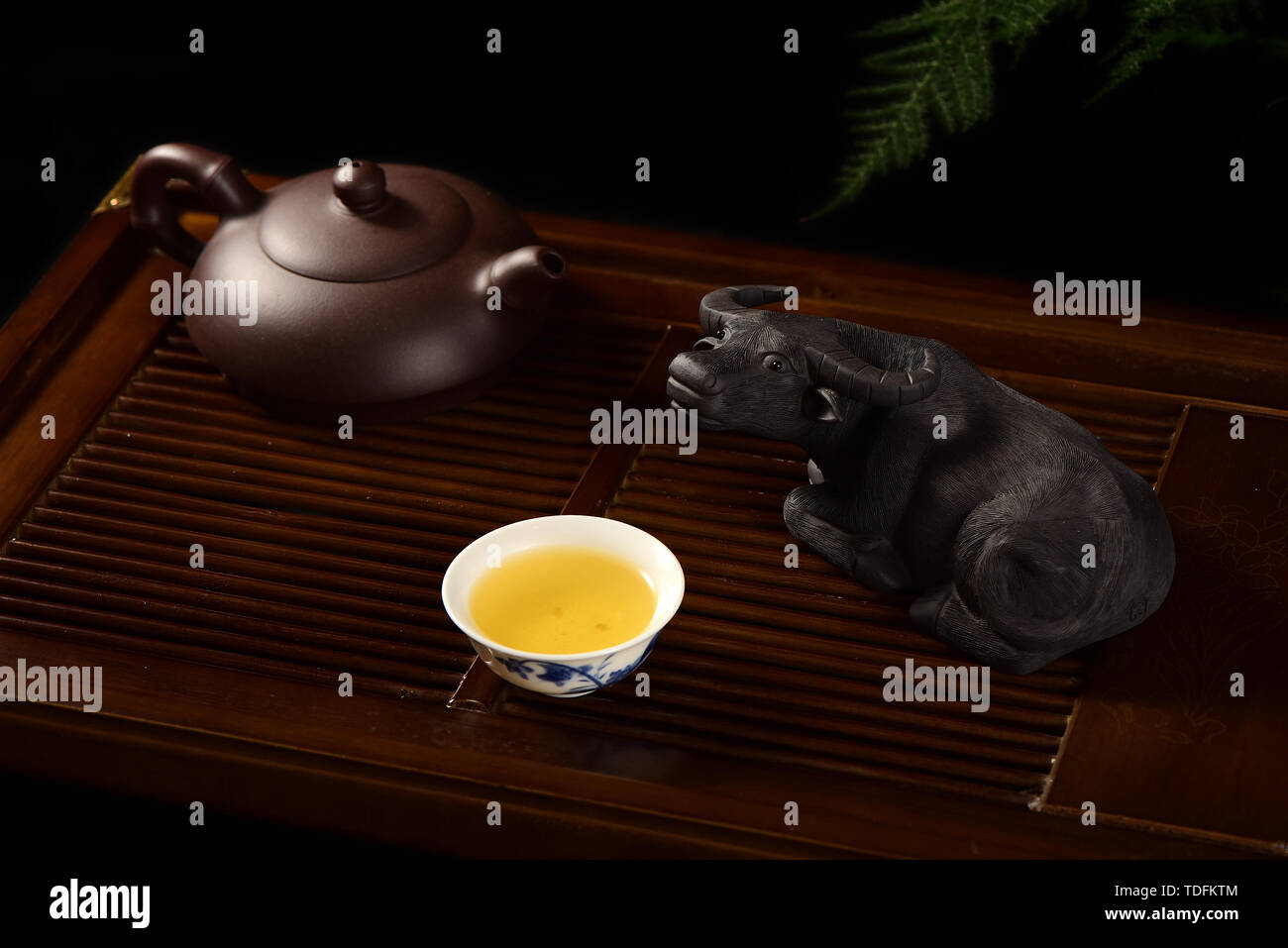 Purple sand teapot tea cup tea set tea culture tea pet buffalo Stock ...