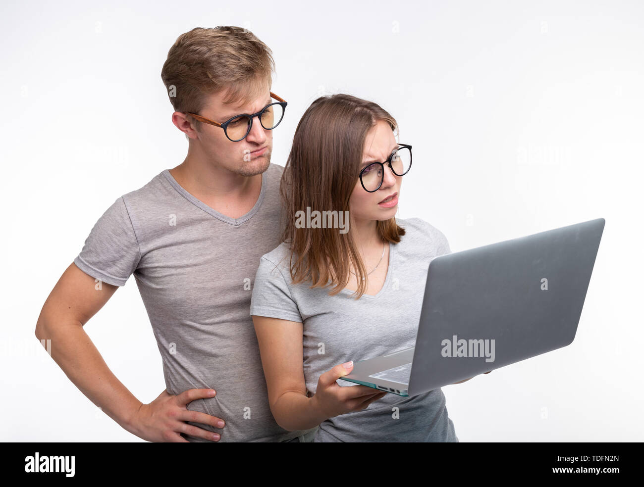 Nerds, study, people concept - a couple of student people look with ...