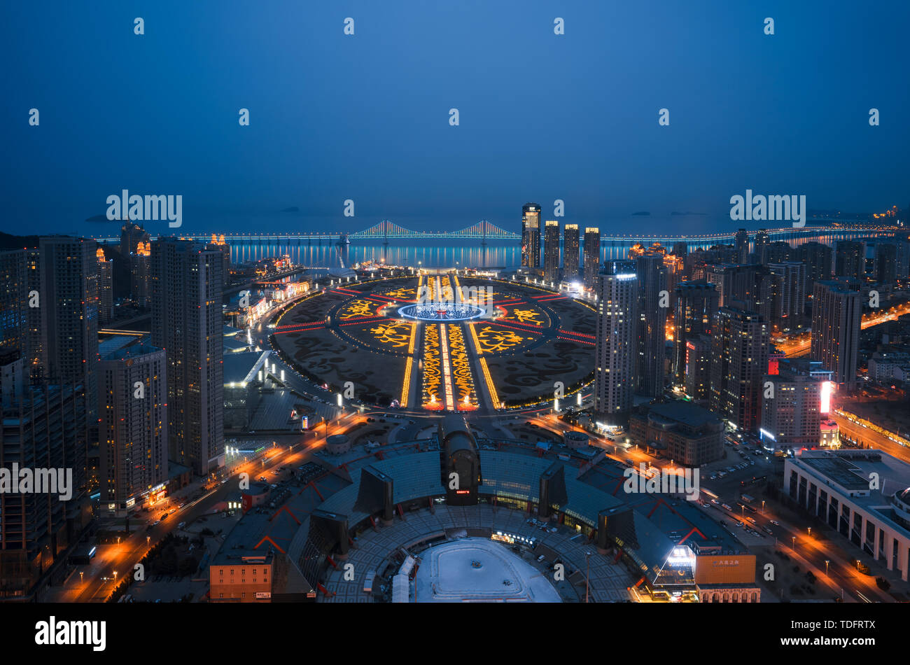 Night view of Xinghai Plaza in Dalian Stock Photo - Alamy