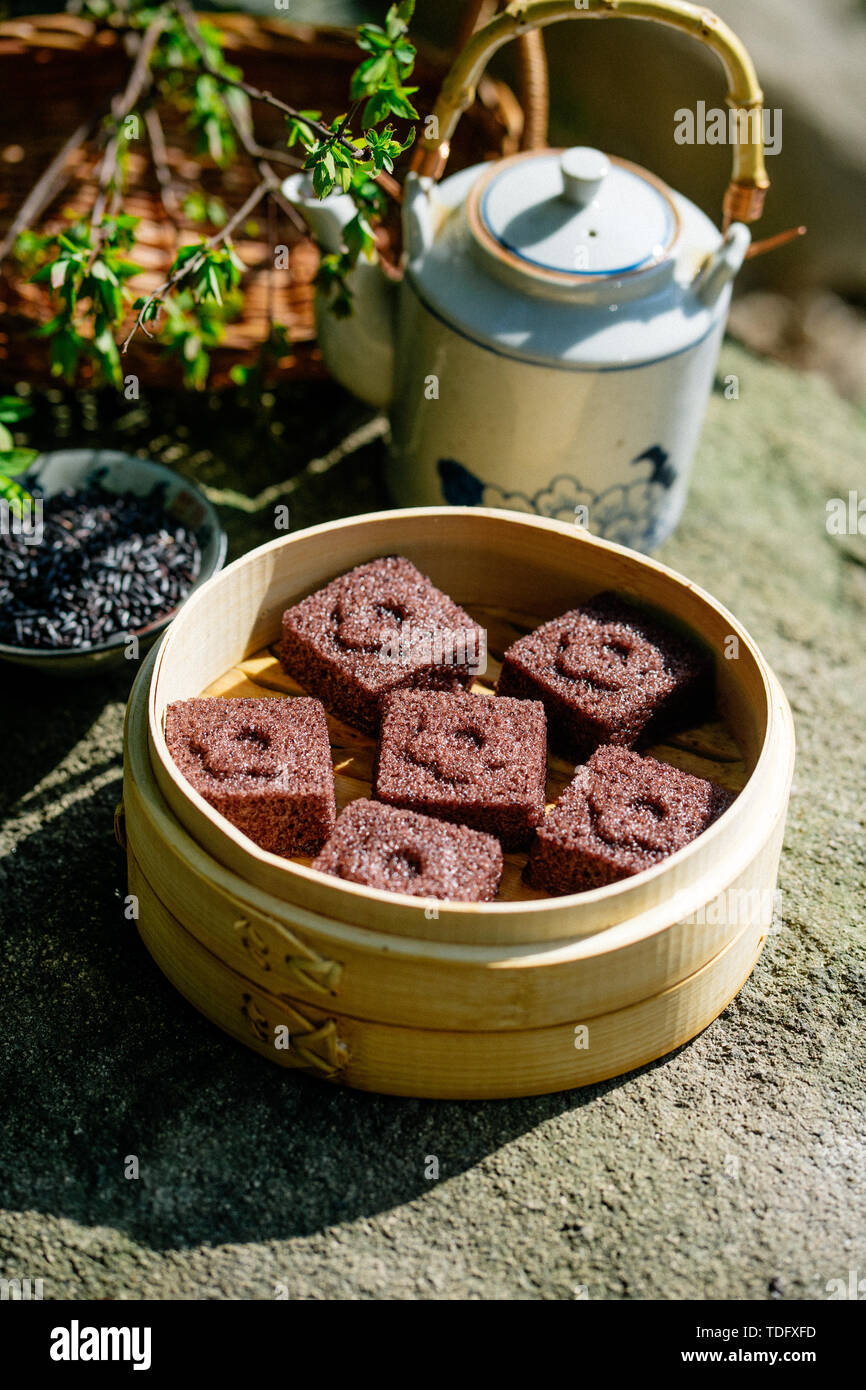 Black rice cake in the steamer Stock Photo - Alamy