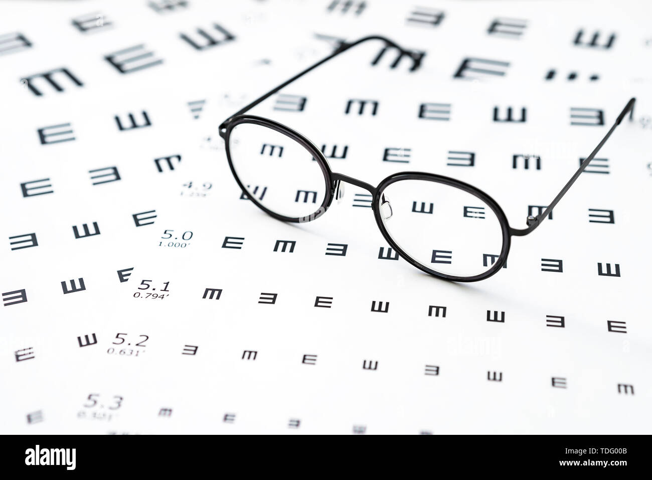 Glasses and visual meter on white background Stock Photo - Alamy