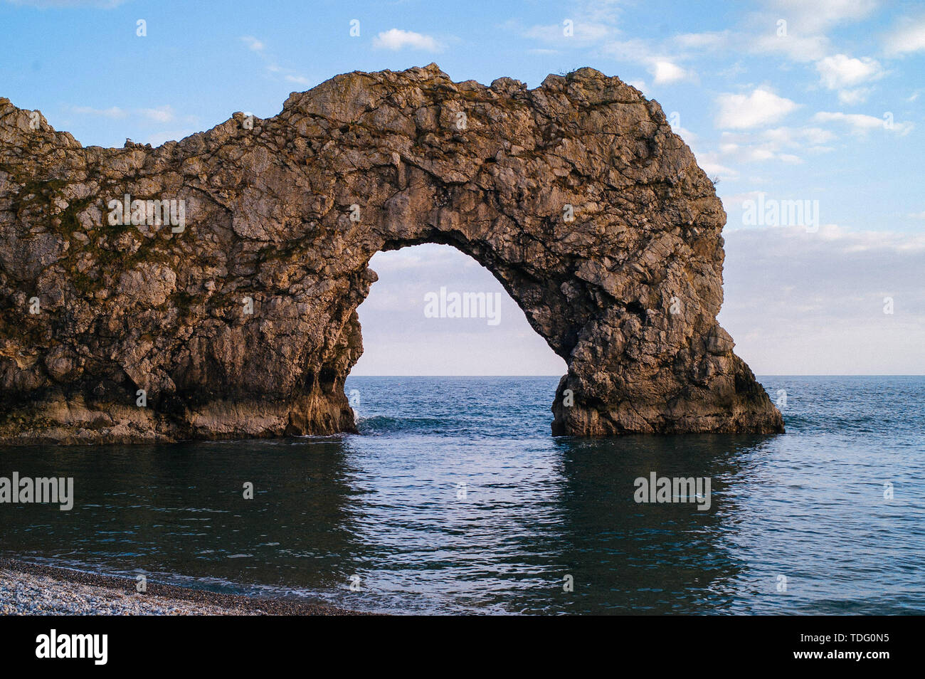 The limestone Durdle Door arch on the Jurrasic Coast in Dorset, England ...