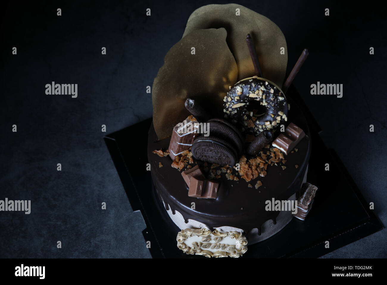 Birthday cake in a dark background Stock Photo - Alamy