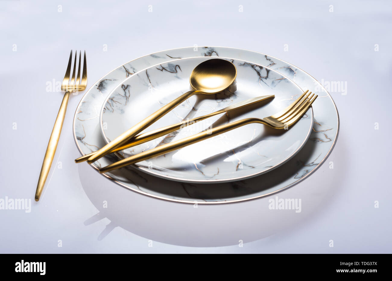 Gold cutlery hi-res stock photography and images - Alamy