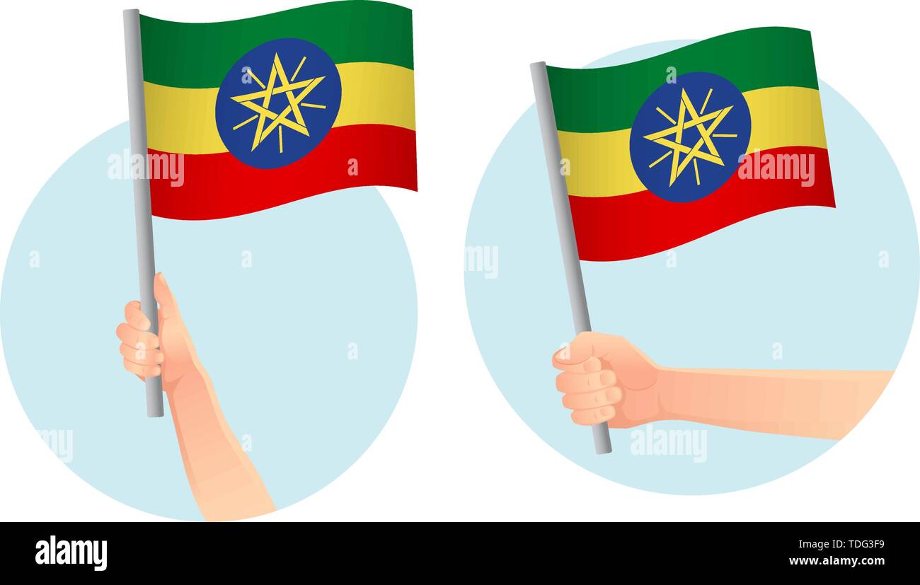 Ethiopia flag in hand. Patriotic background. National flag of Ethiopia ...