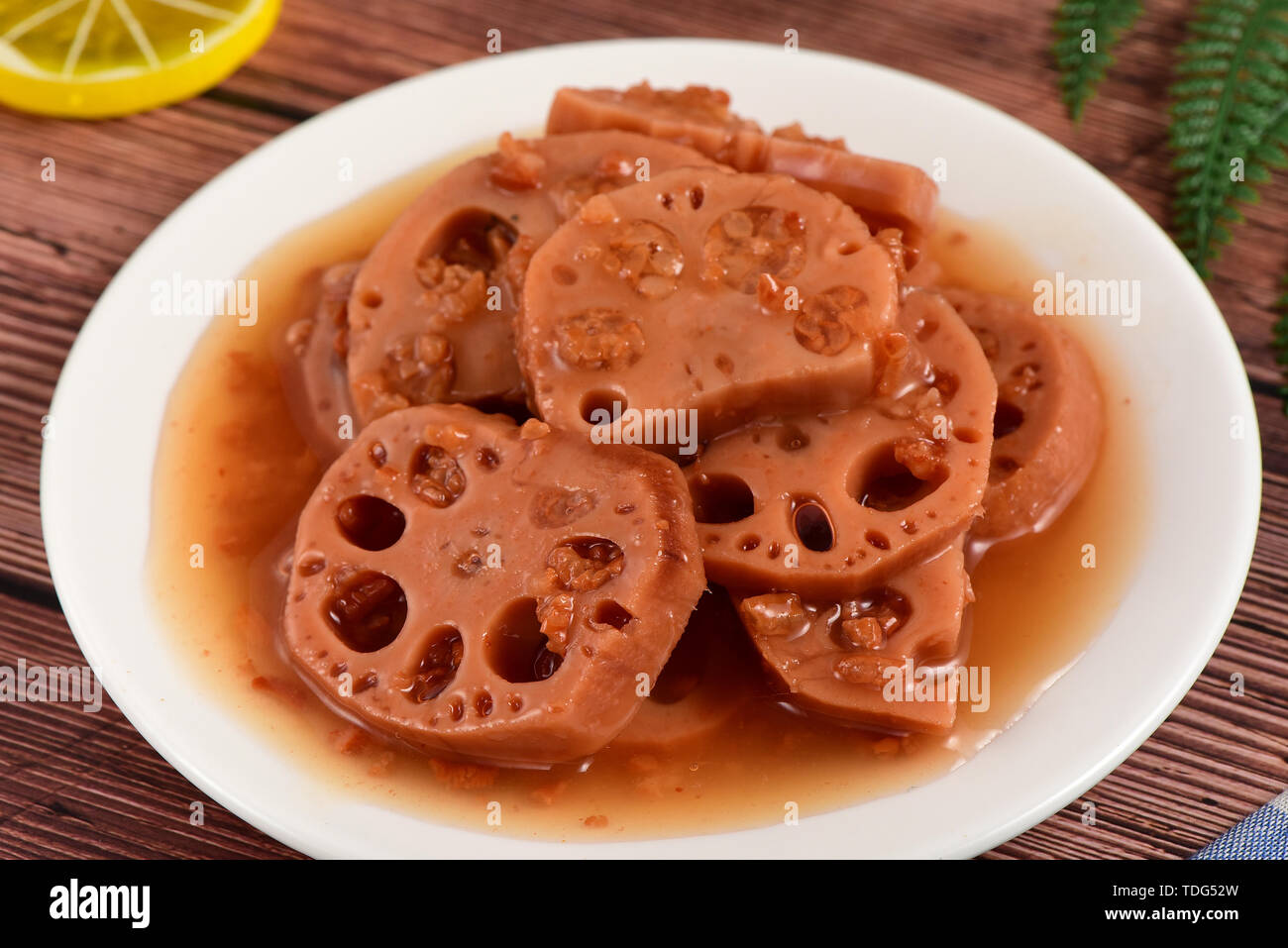 Gourmet honey lotus root slices Stock Photo - Alamy