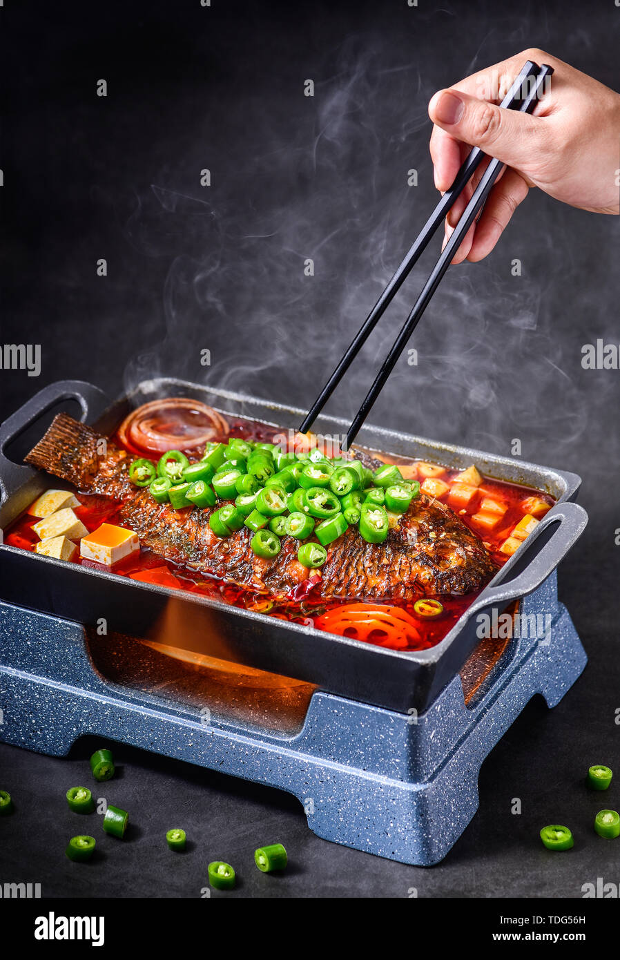 Green pepper grilled fish Stock Photo - Alamy