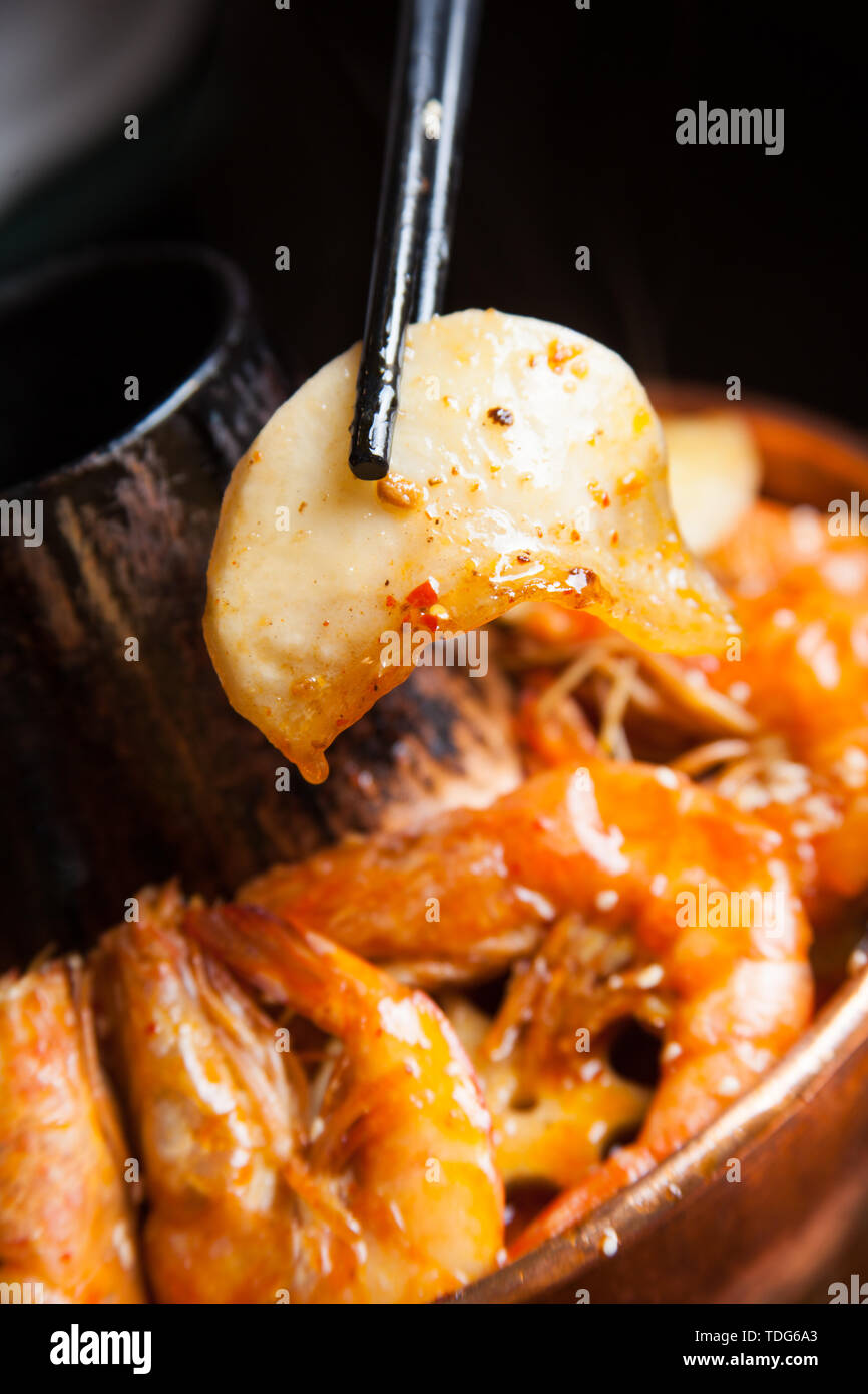 Charcoal grilled prawn pot combination Stock Photo - Alamy