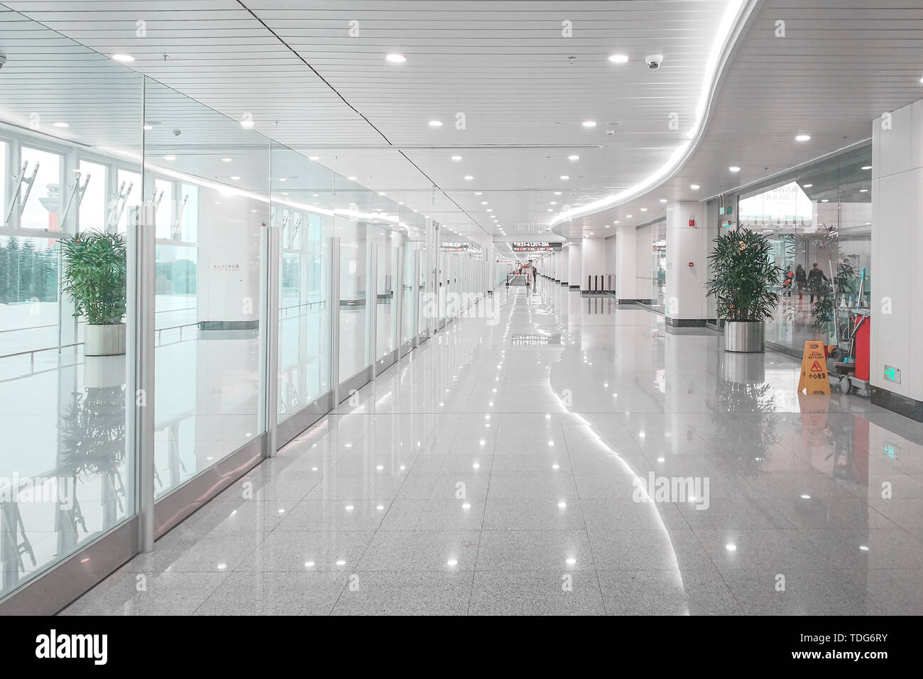 Commercial building hallway lobby, window light Stock Photo - Alamy