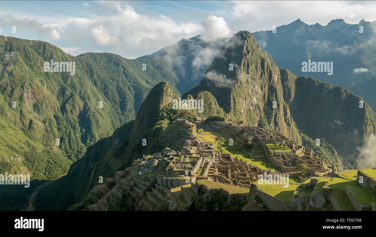 iconic view of peru's famous lost inca city of machu picchu on a misty ...