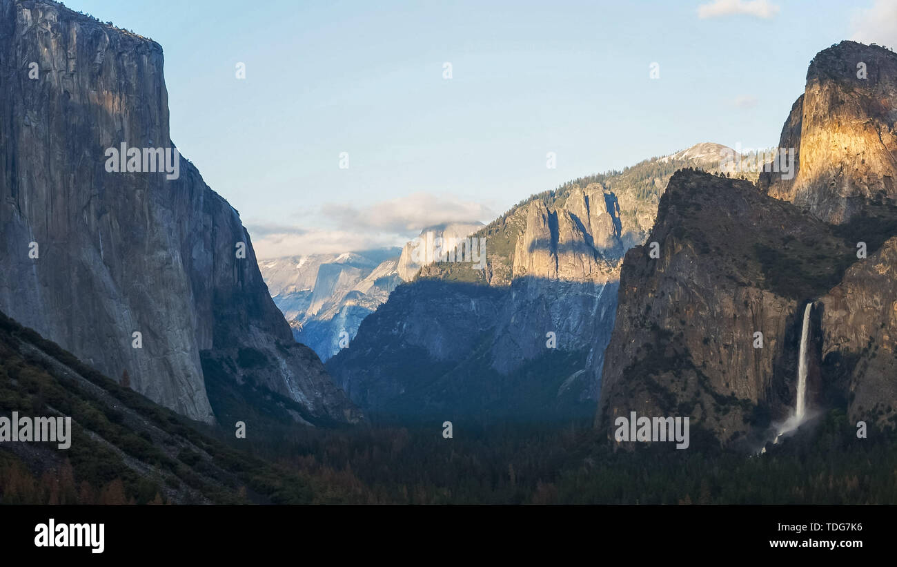 sunset shot of half dome and bridalveil falls from tunnel view in ...