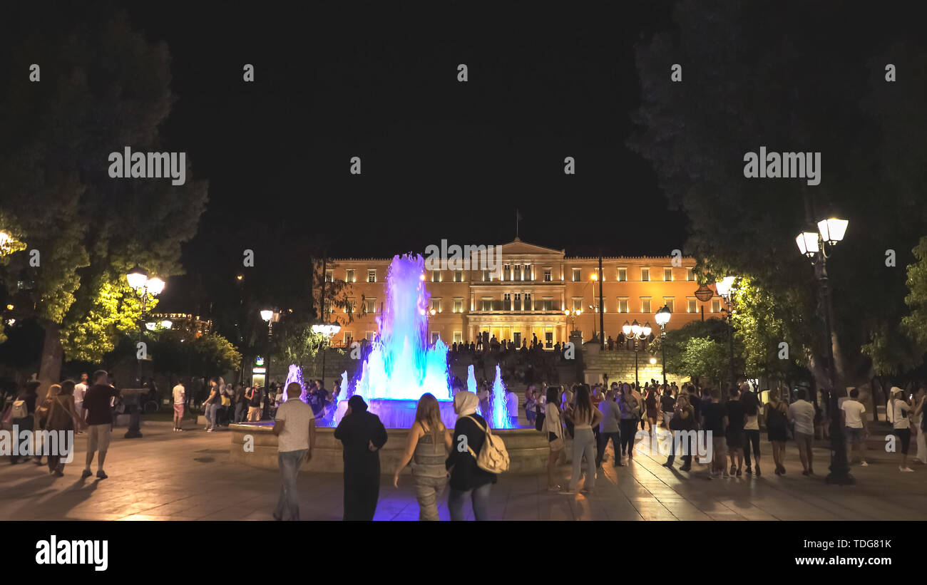 ATHENS, GREECE- SEPTEMBER, 4, 2016: water fountain and crowds in ...