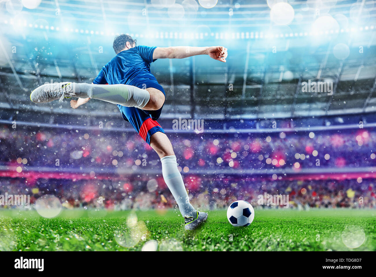 Team action kicking ball hi-res stock photography and images - Alamy
