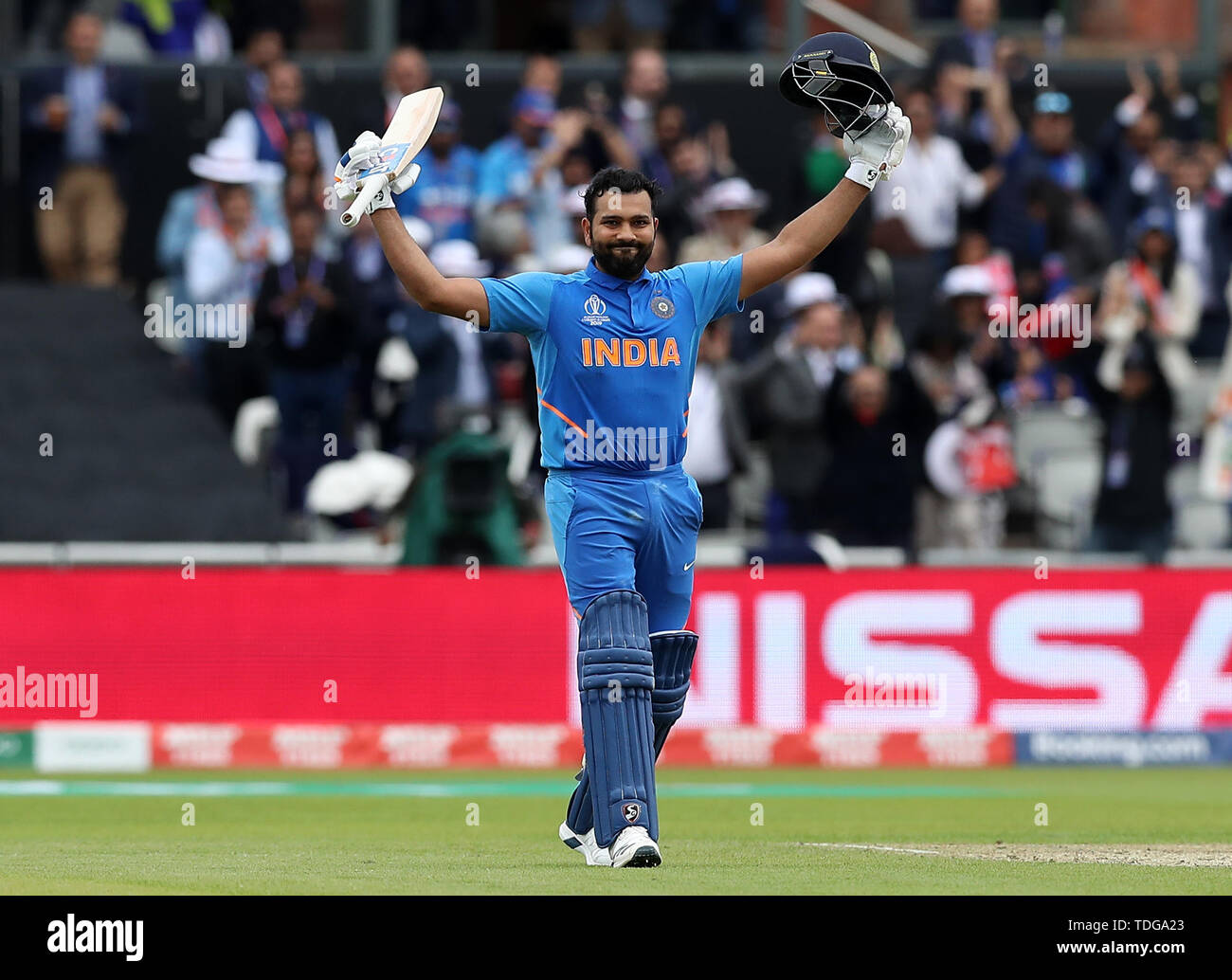 India's Rohit Sharma celebrates reaching his century during the ICC ...