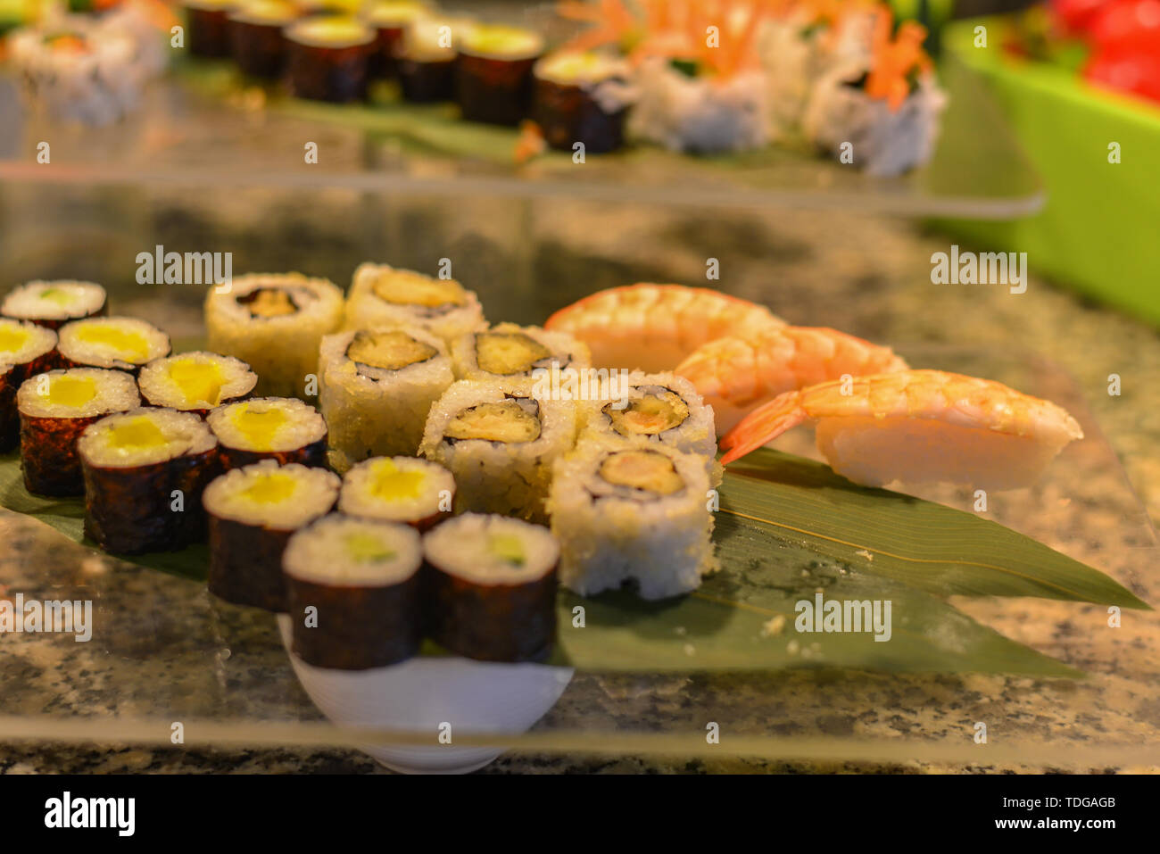 Sushi rolls at the luxury buffet restaurant. Food concept Stock Photo ...