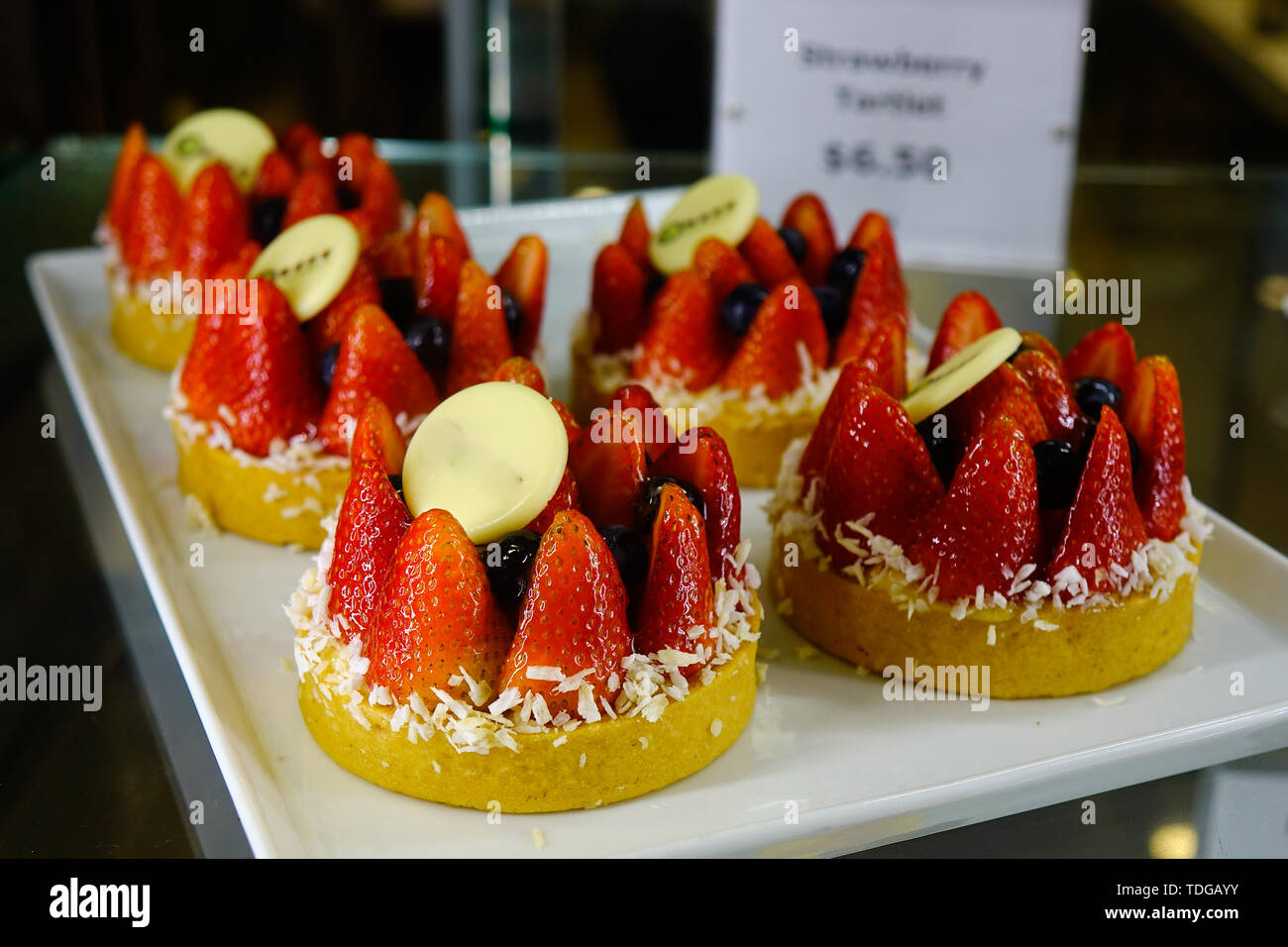 Sweet table (strawberry tarts) at luxury buffet restaurant. Food ...
