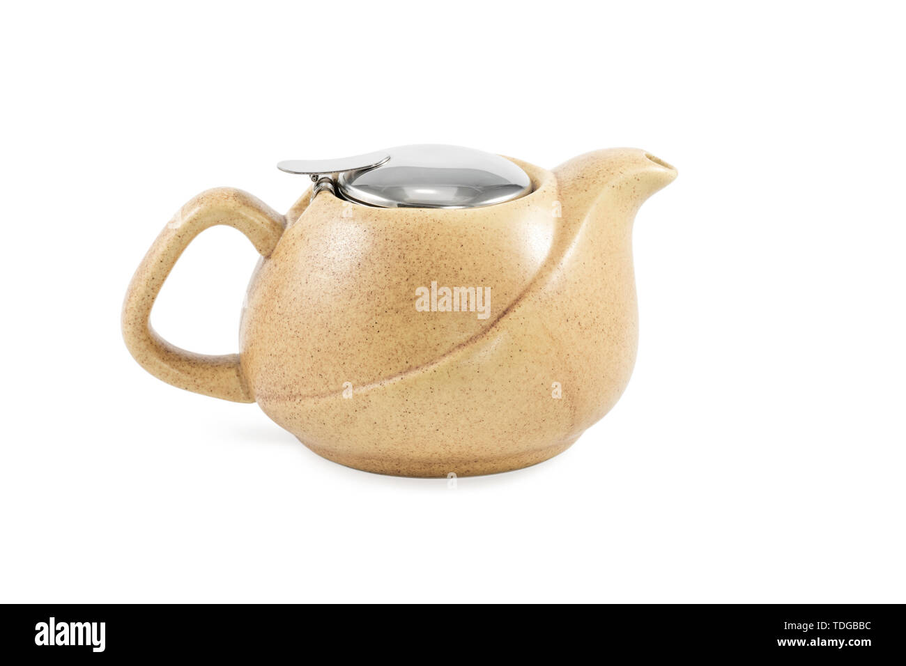 beige ceramic teapot with metal lid and handle on the side isolated on ...