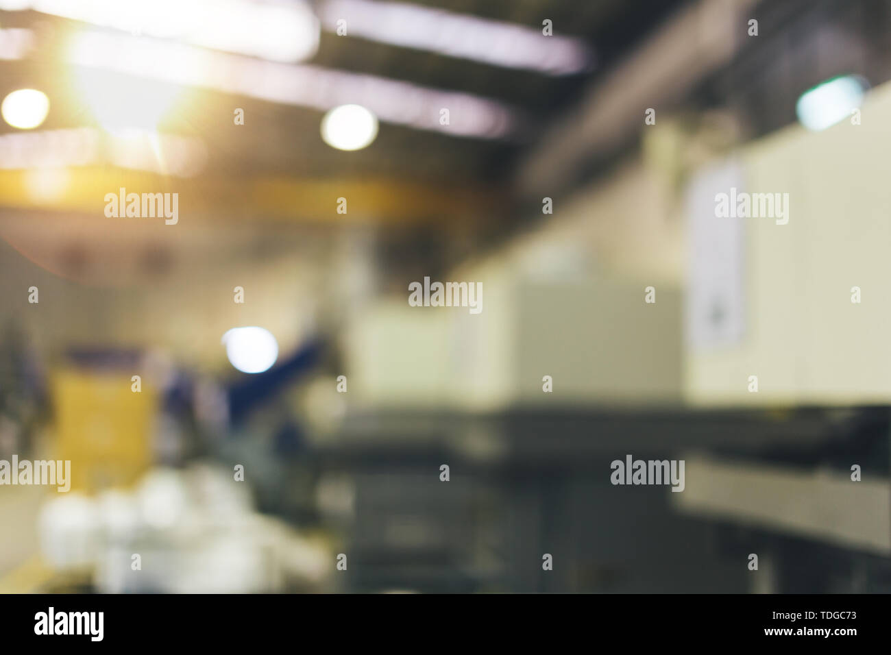 Blurred and abstract industrial factory and machinery production line ...