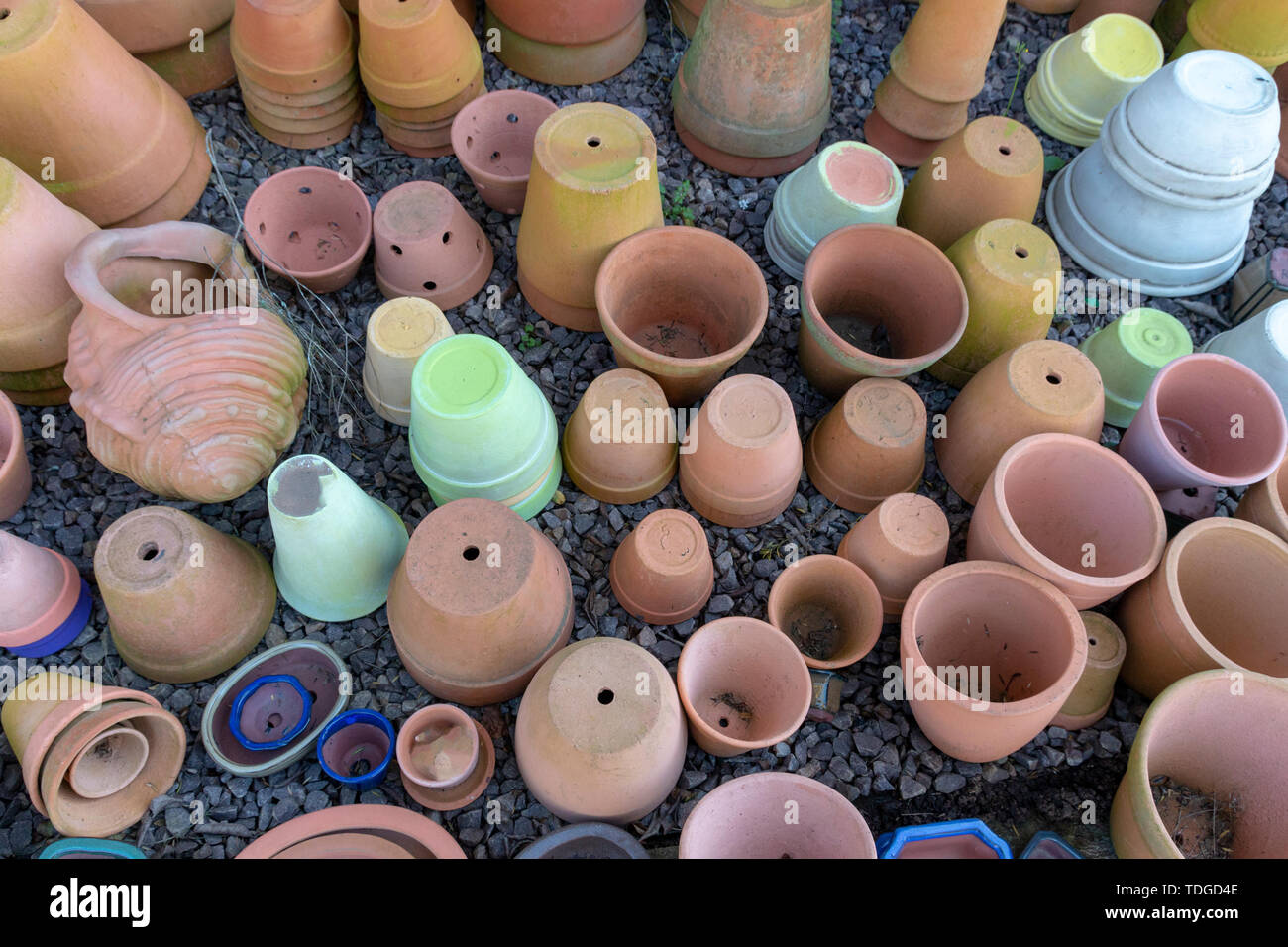 A close up view of lots of small ceramic pots all sitting on small ...
