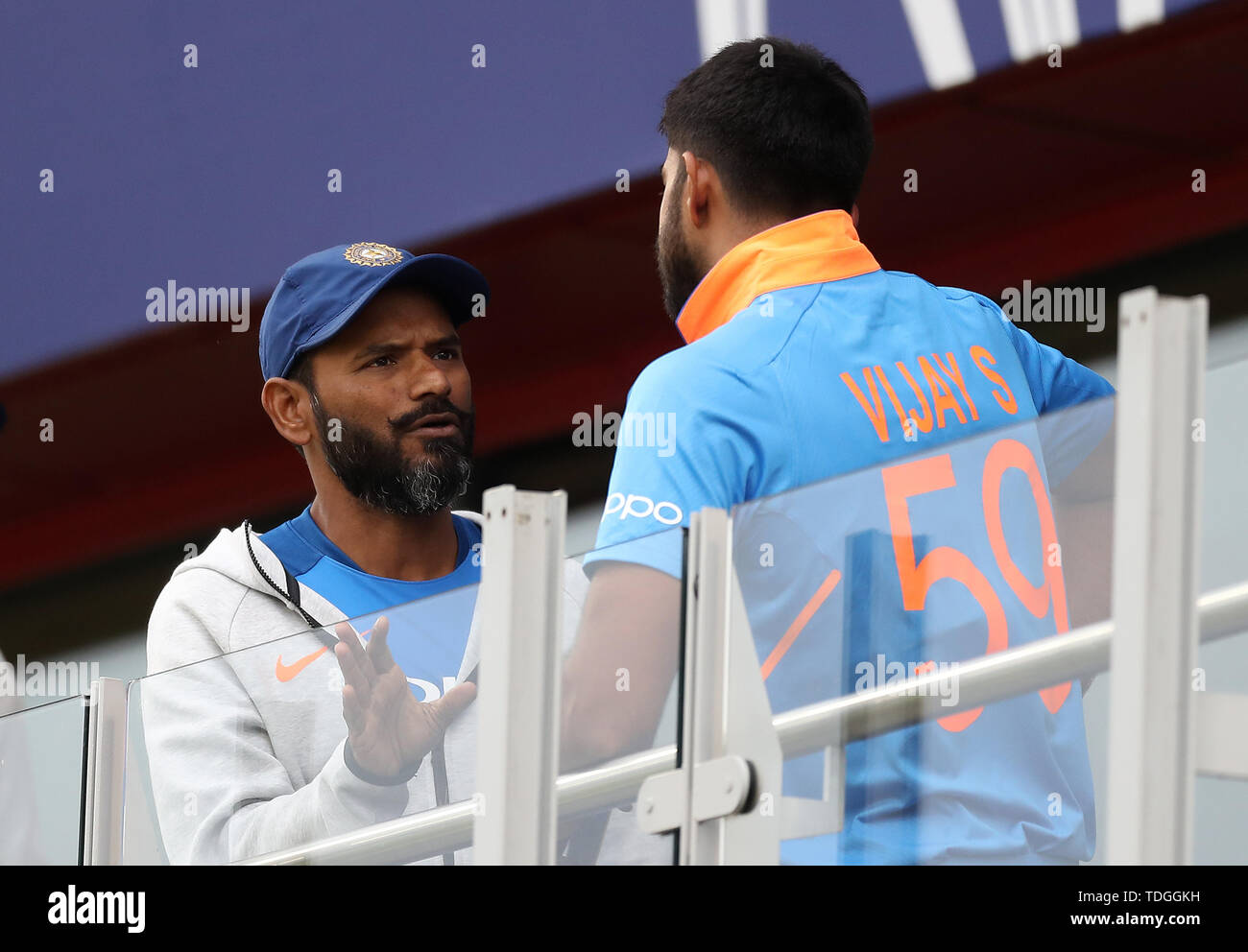 India's fielding coach Ramakrishnan Sridhar speaks with Murali Vijay ...