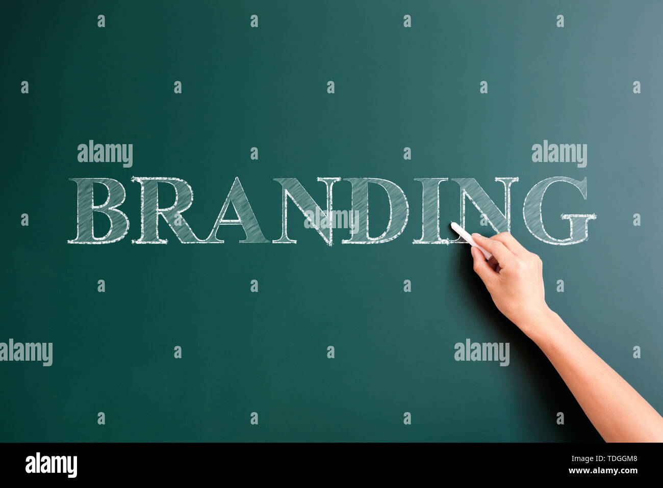Branding written on blackboard Stock Photo - Alamy