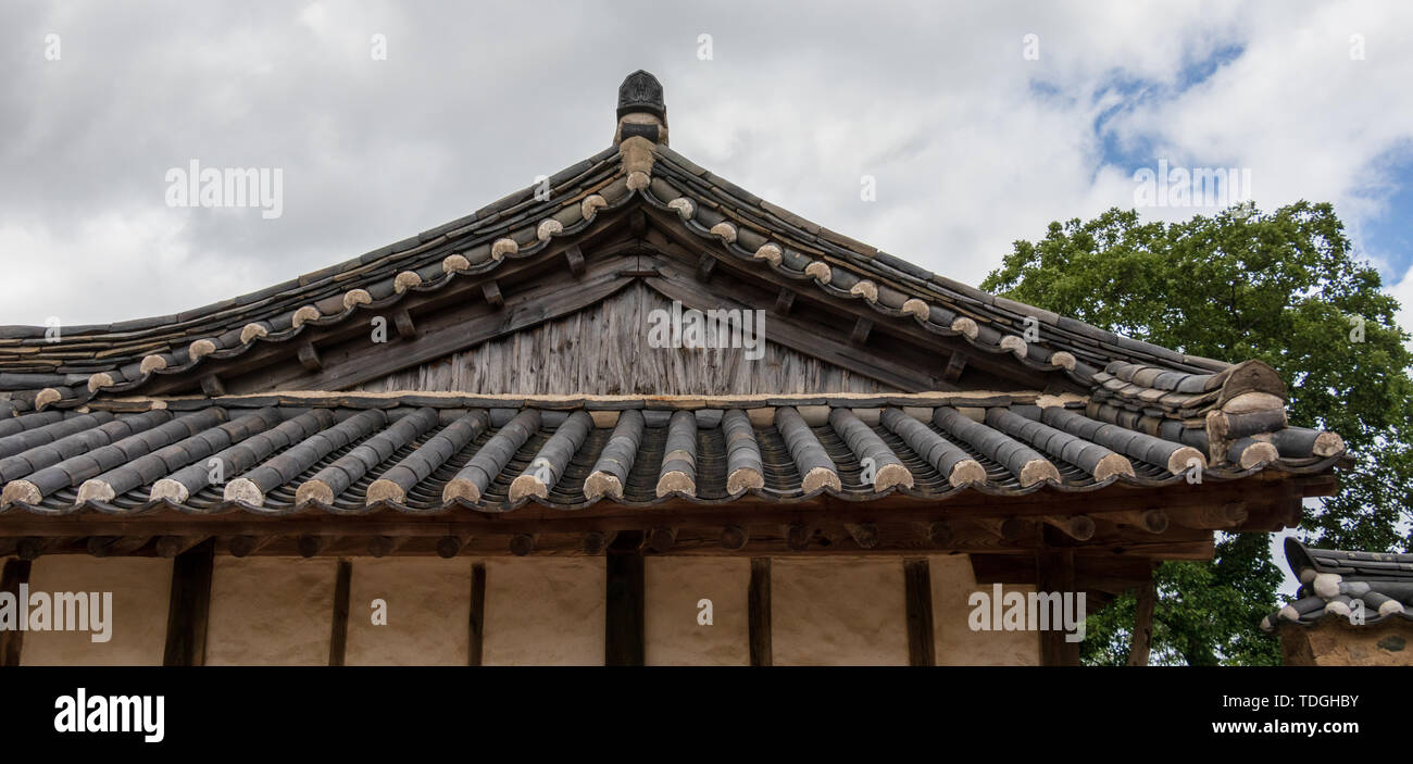 Details of korean traditional style tiled roof over a wooden ...
