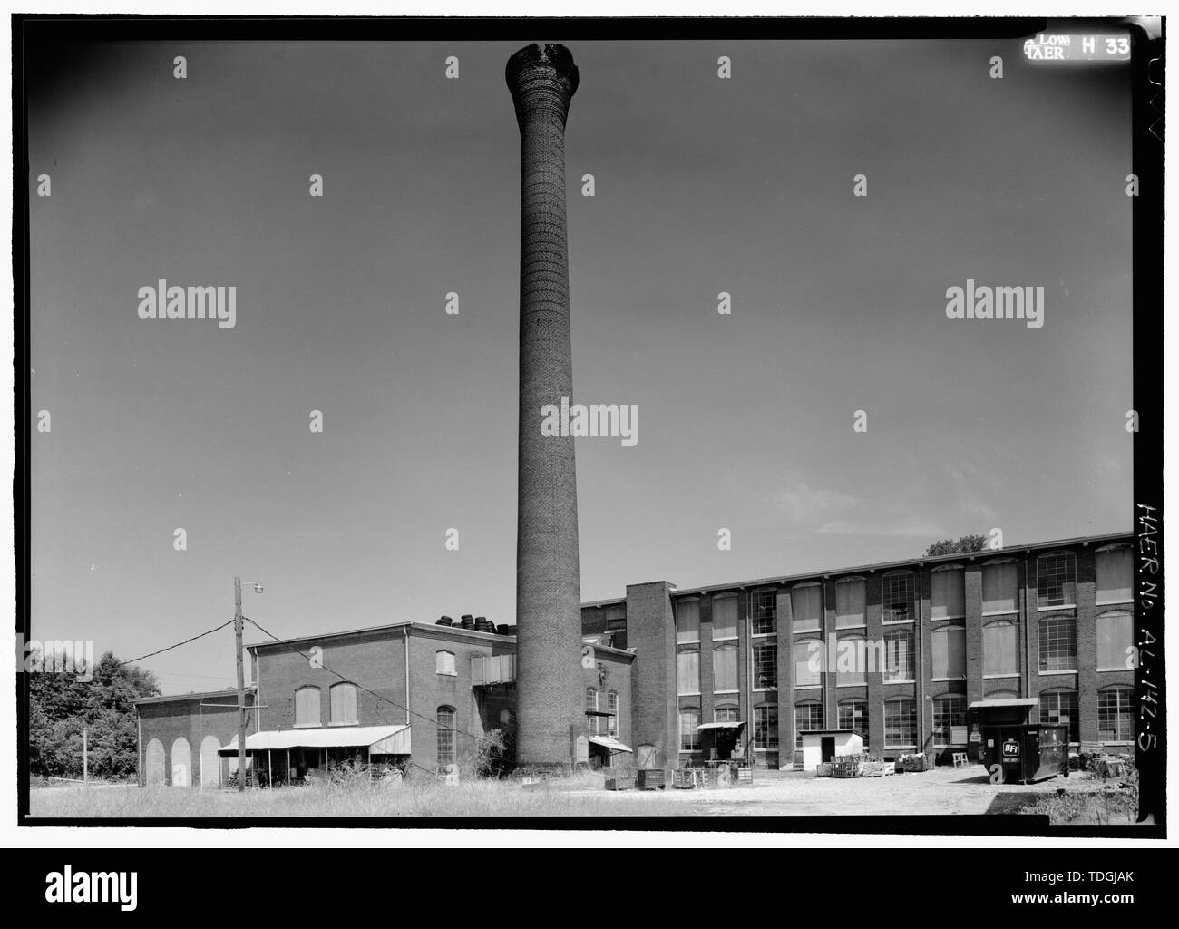 North-northwest elevations of boiler stack and boiler room. Note tires ...