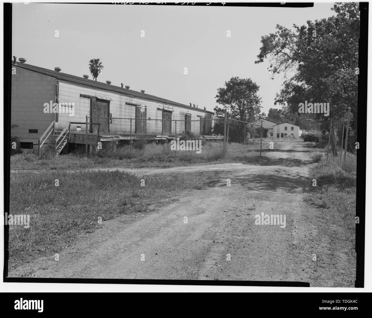 Northwest elevation, showing railroad spur loading dock, and facility ...