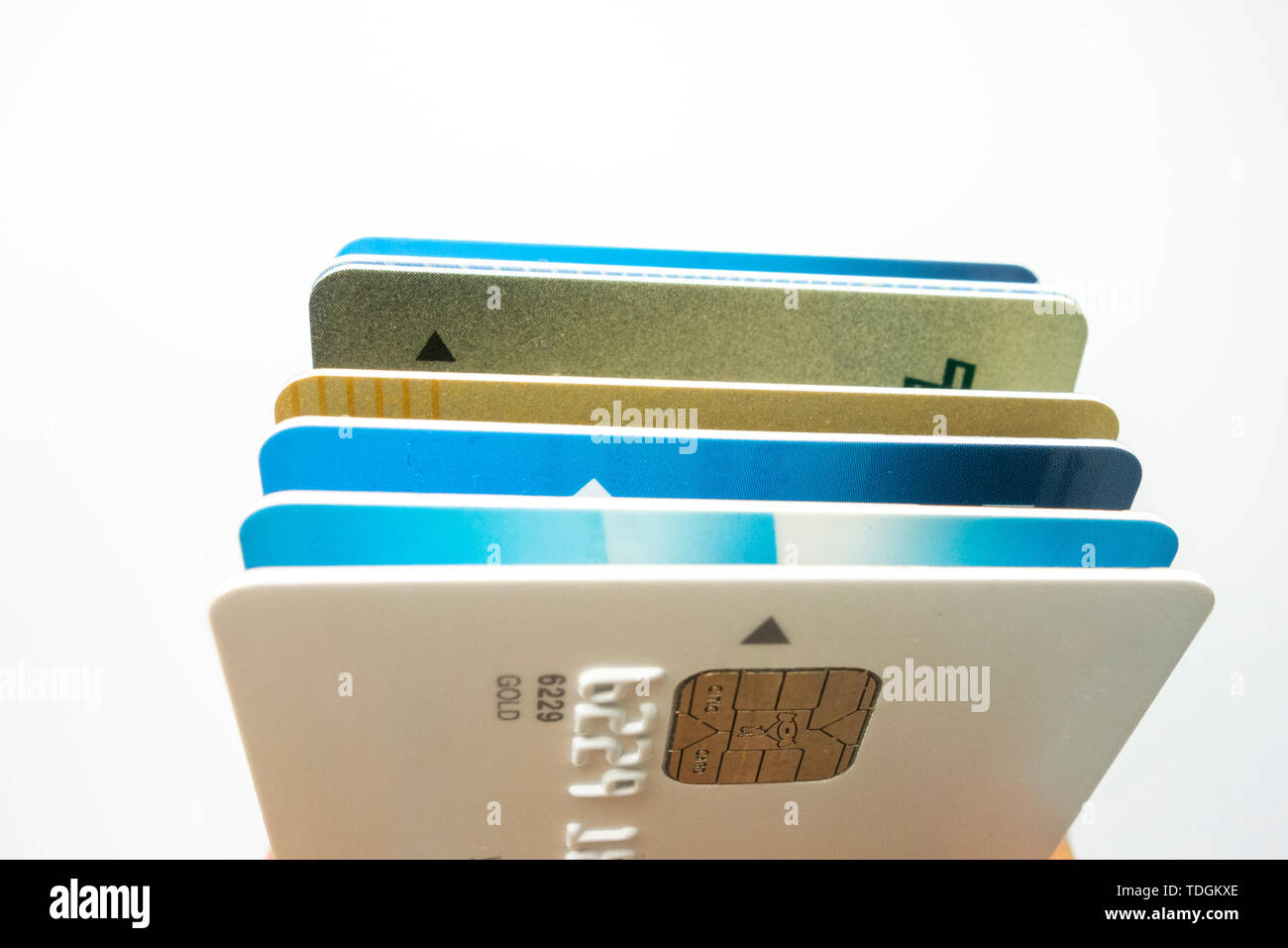 Multiple bank cards stacked together Stock Photo - Alamy