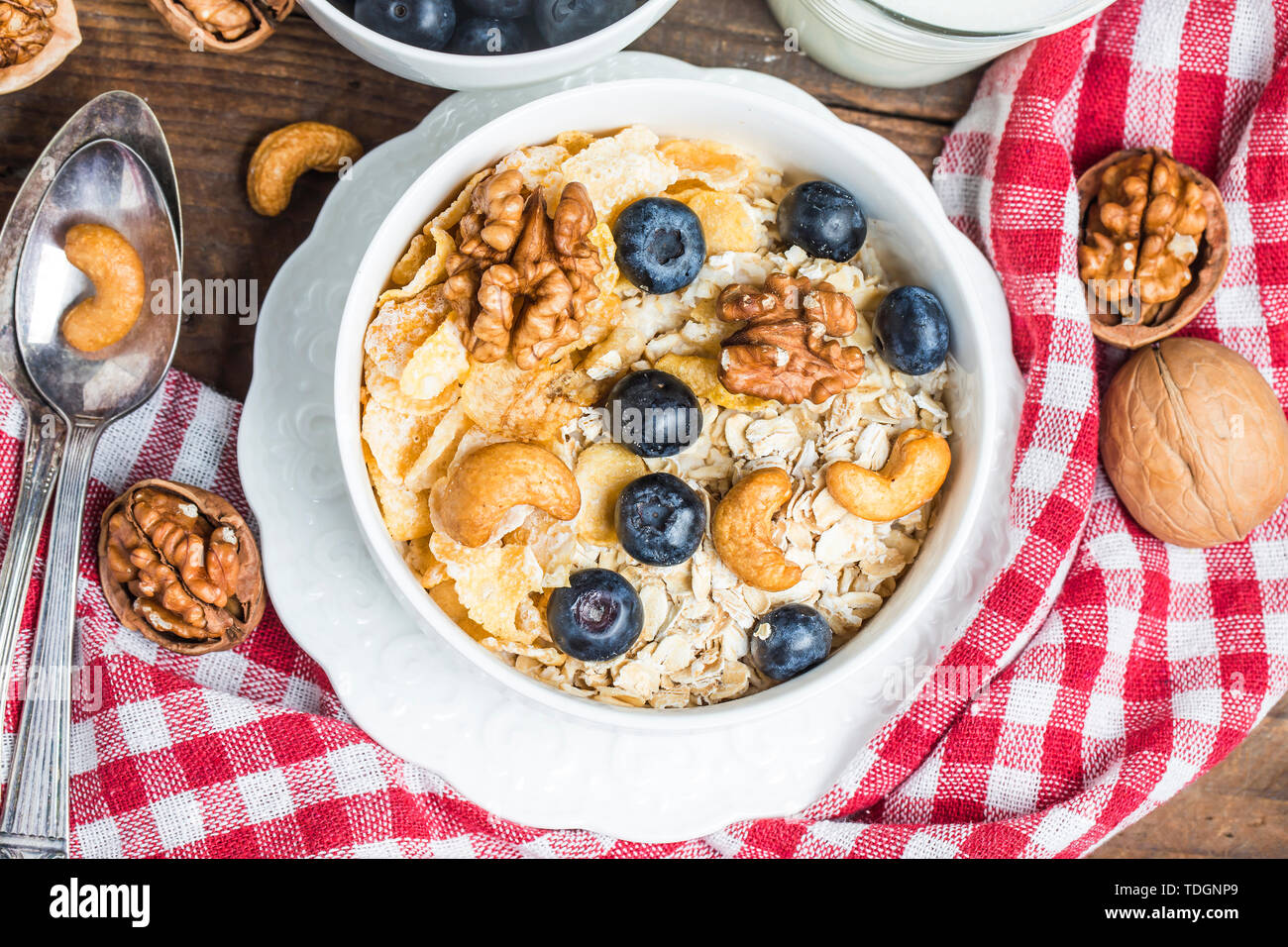 Fruit, nut, oatmeal breakfast Stock Photo - Alamy