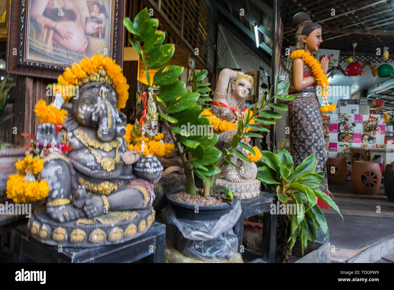 Thai street Buddhist niches Stock Photo - Alamy