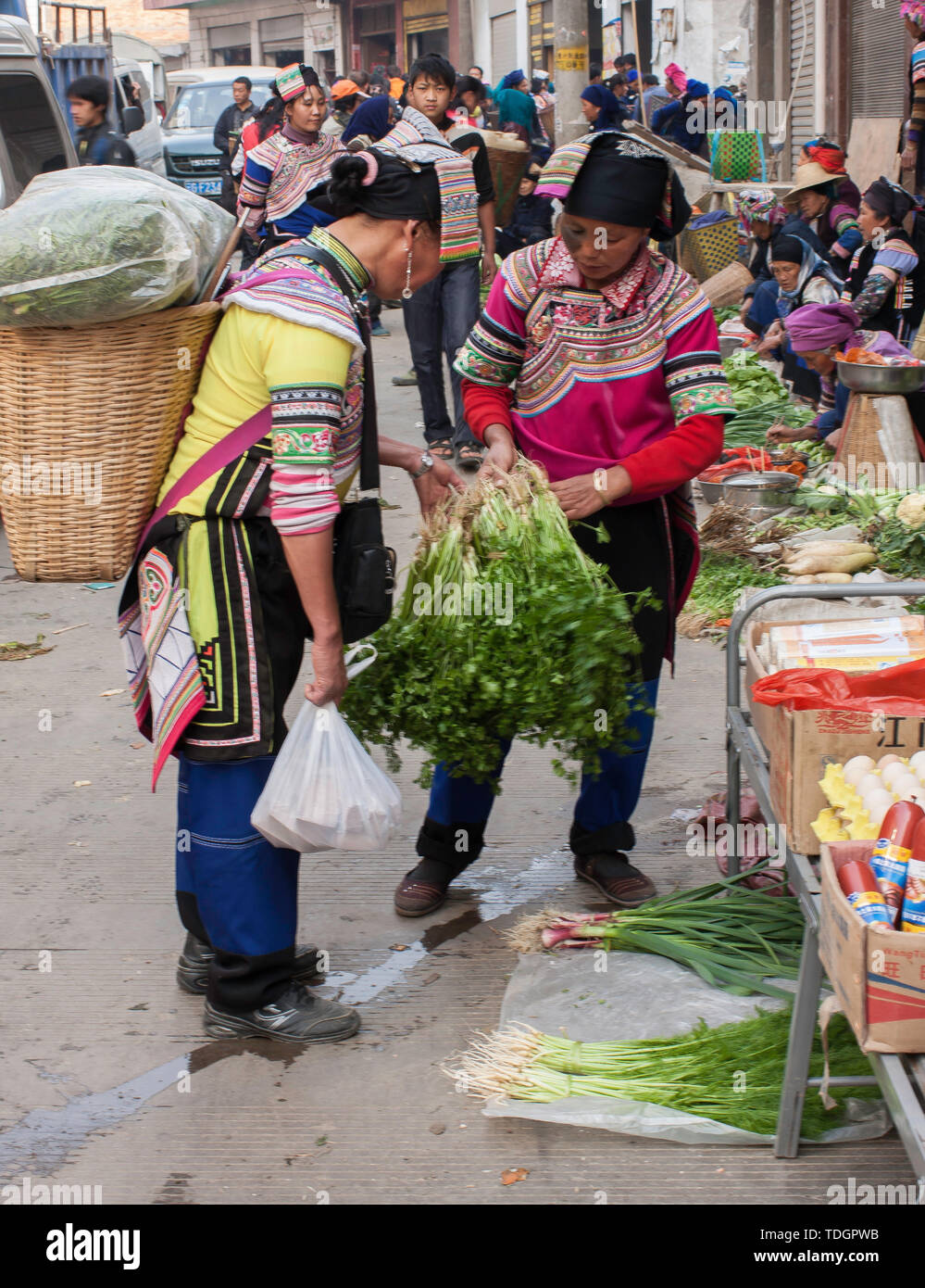 The Hani people at the fair Stock Photo - Alamy